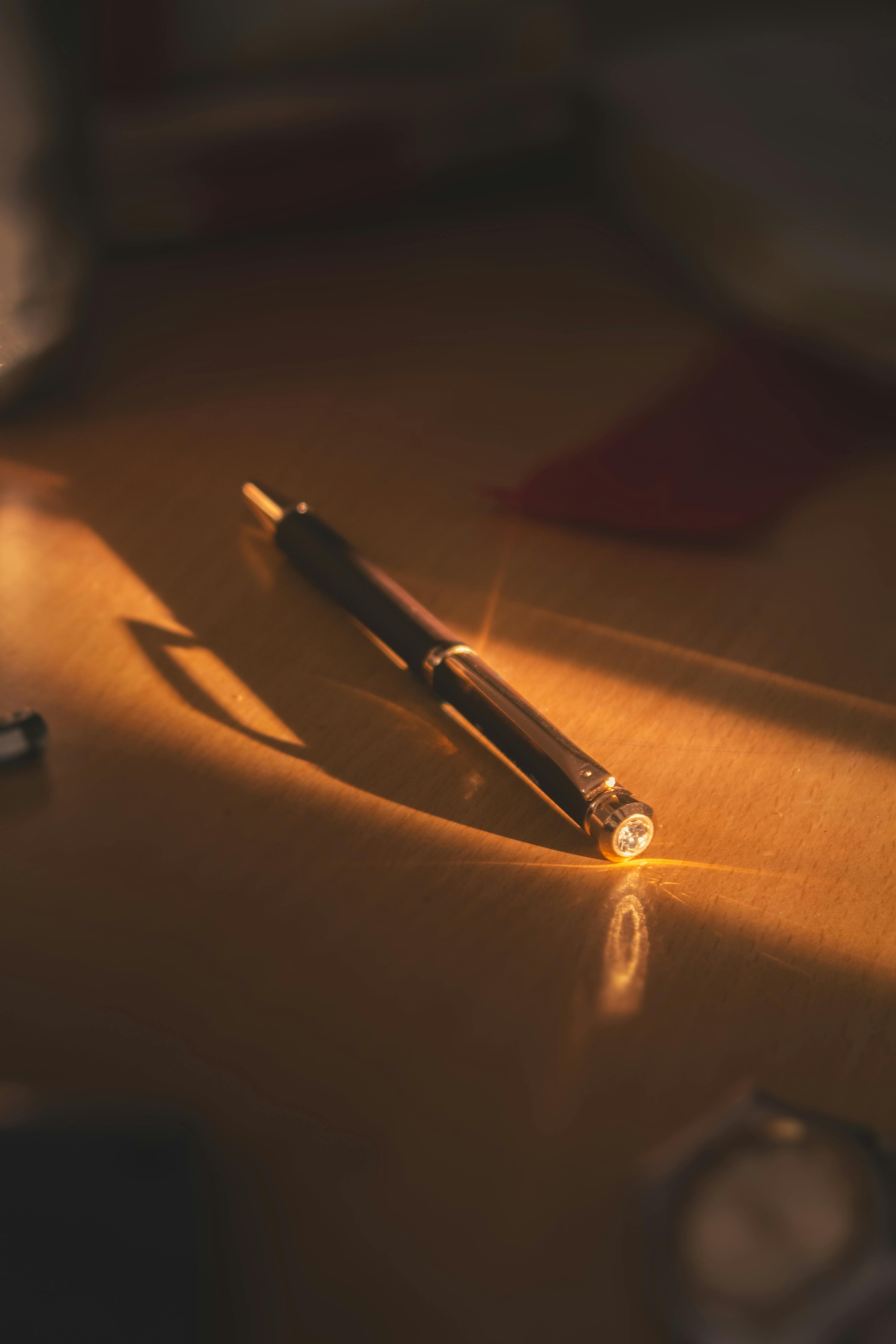 Pen in sunlight · Free Stock Photo