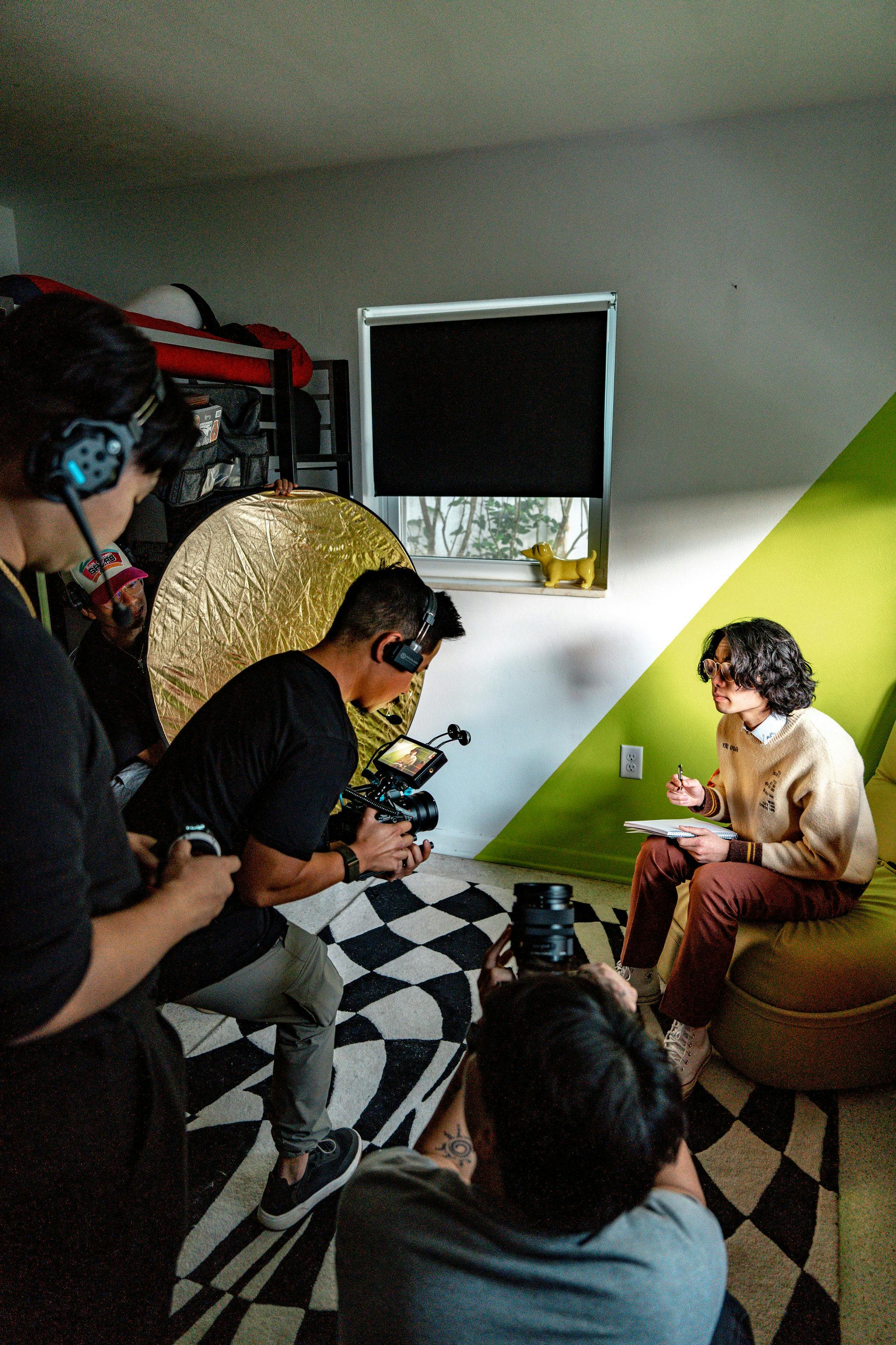 Photographers around Model in Room · Free Stock Photo