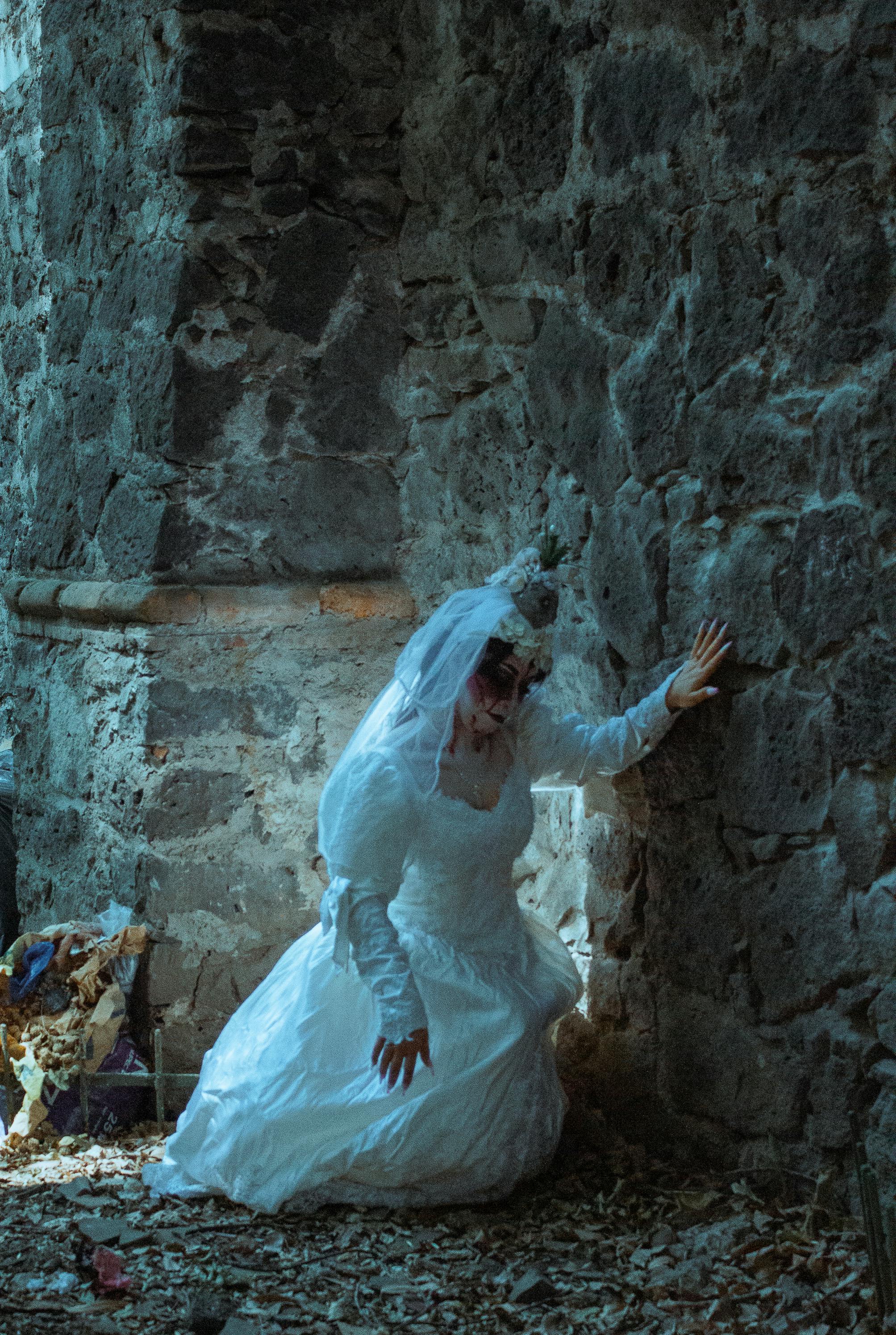 Woman in a Scary Bride Halloween Costume Leaning against a Wall · Free ...