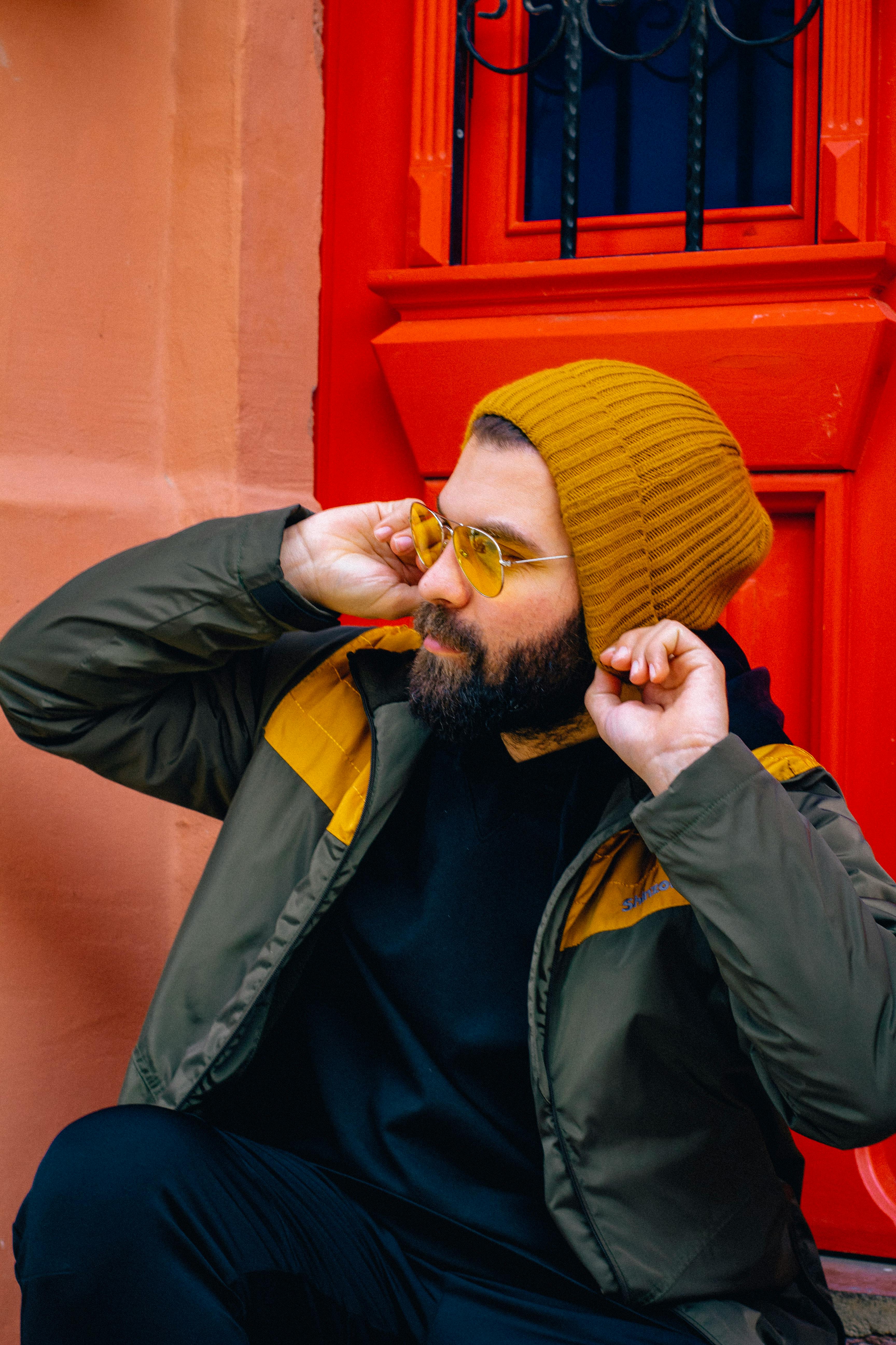 A Man with a Beard in Yellow Cap · Free Stock Photo