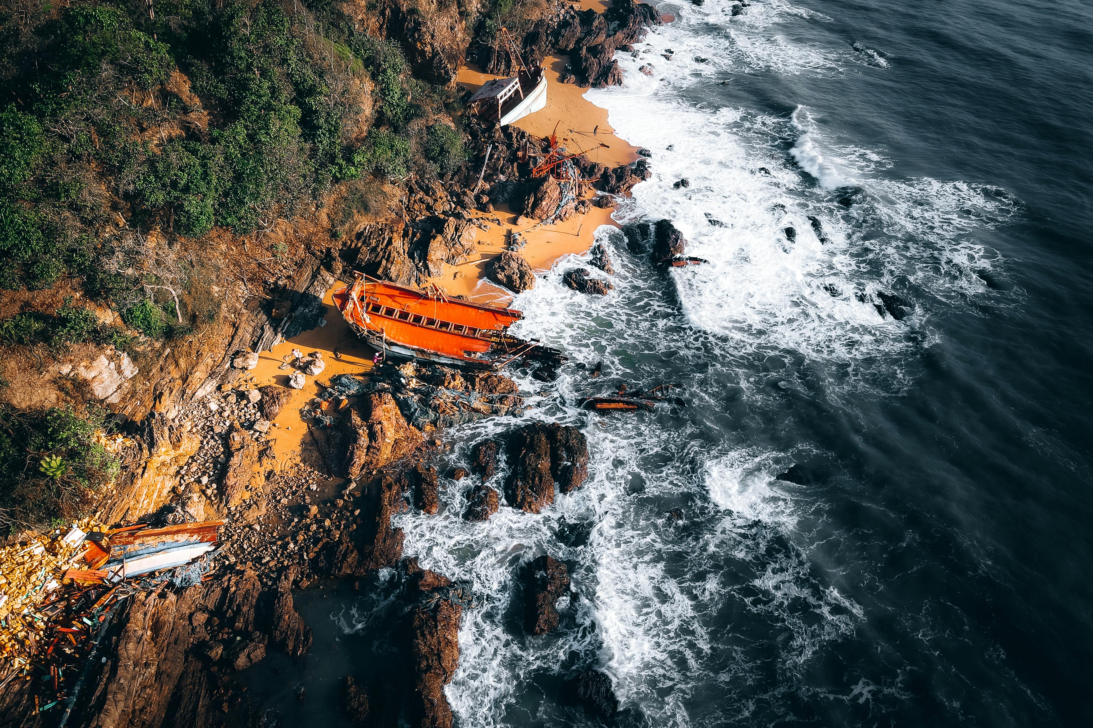 Crashed Ship on the Rocky Beach · Free Stock Photo