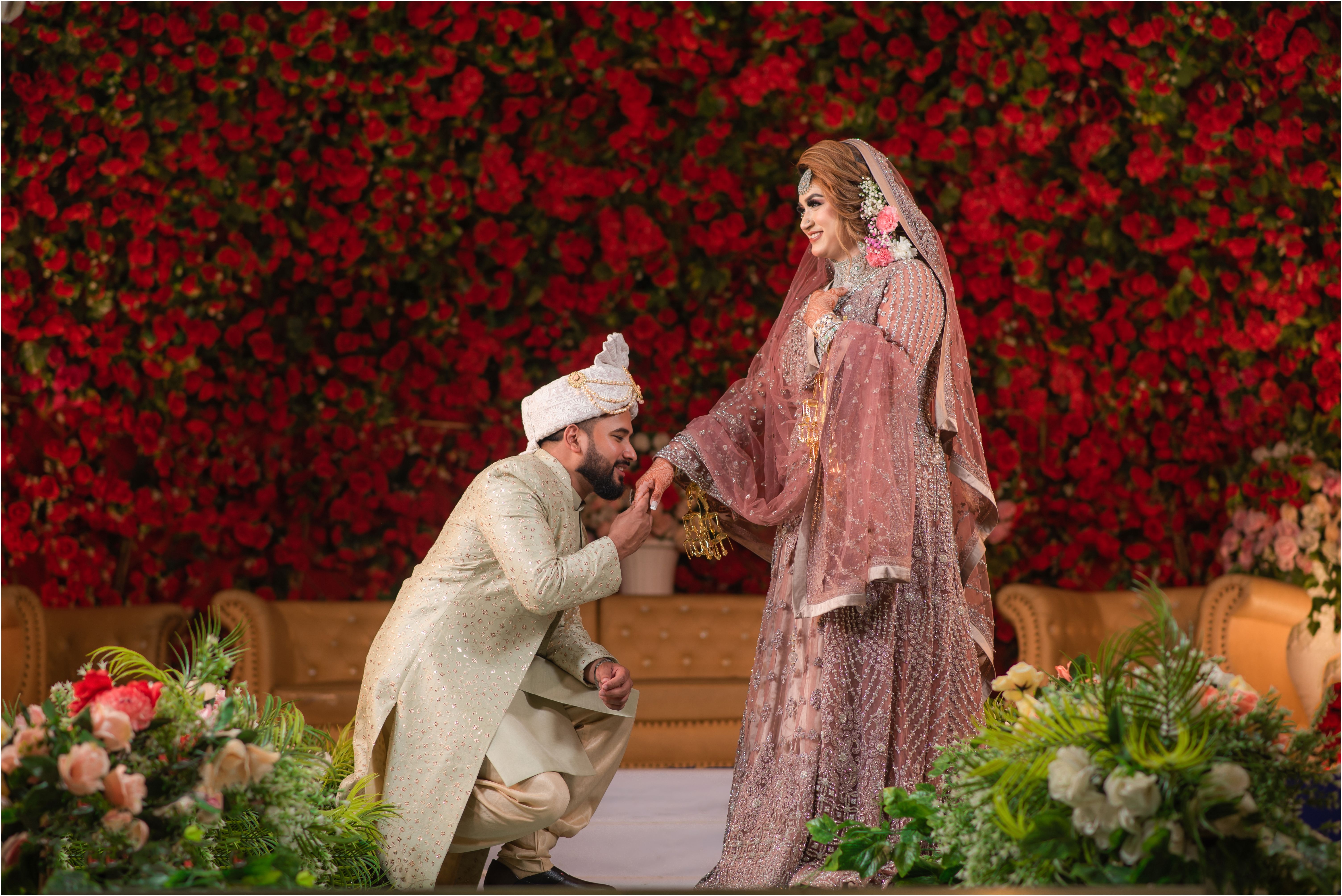 Bride and Groom in Traditional Clothing Posing on the Background of a ...