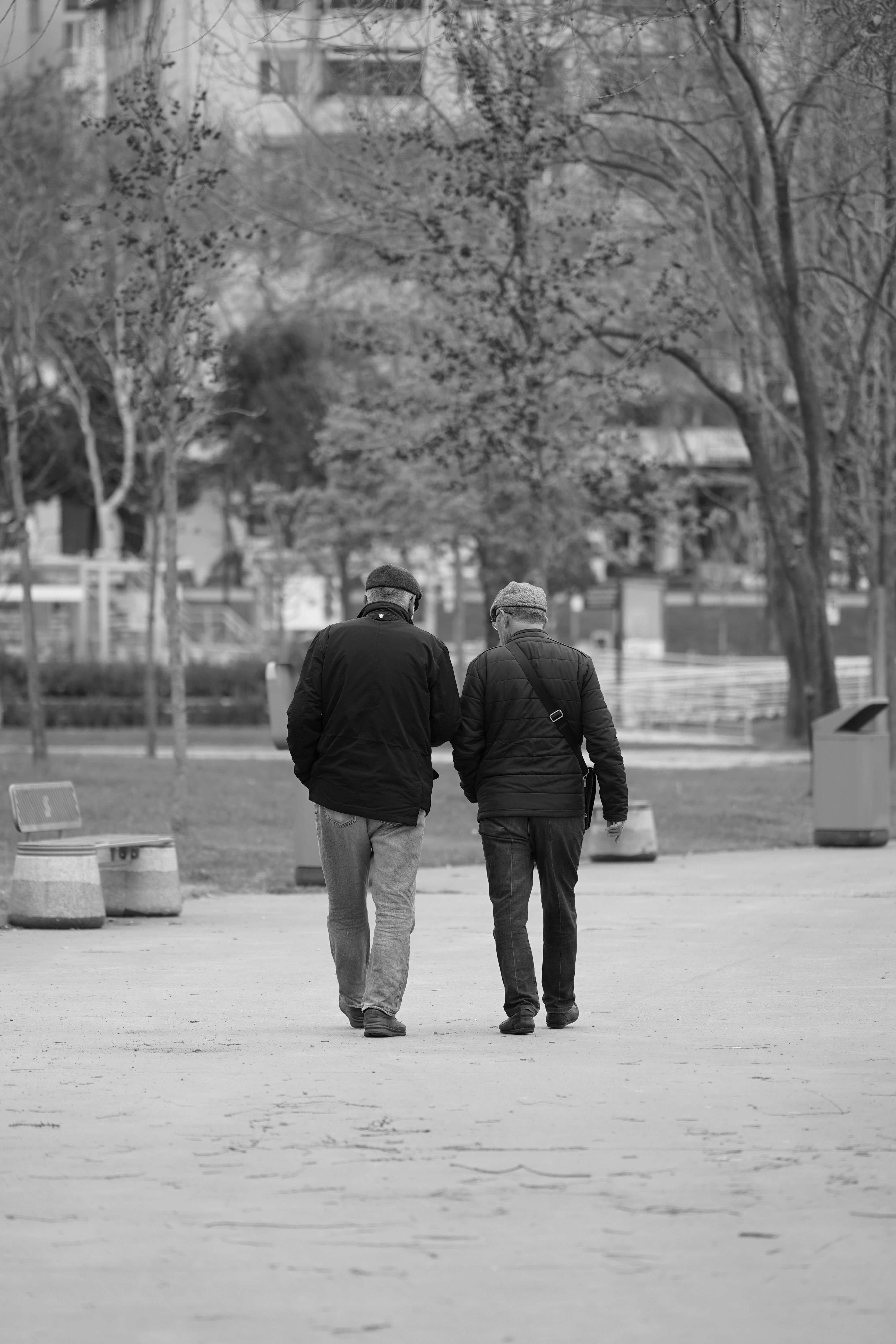Man Walking Beside Woman on Road · Free Stock Photo