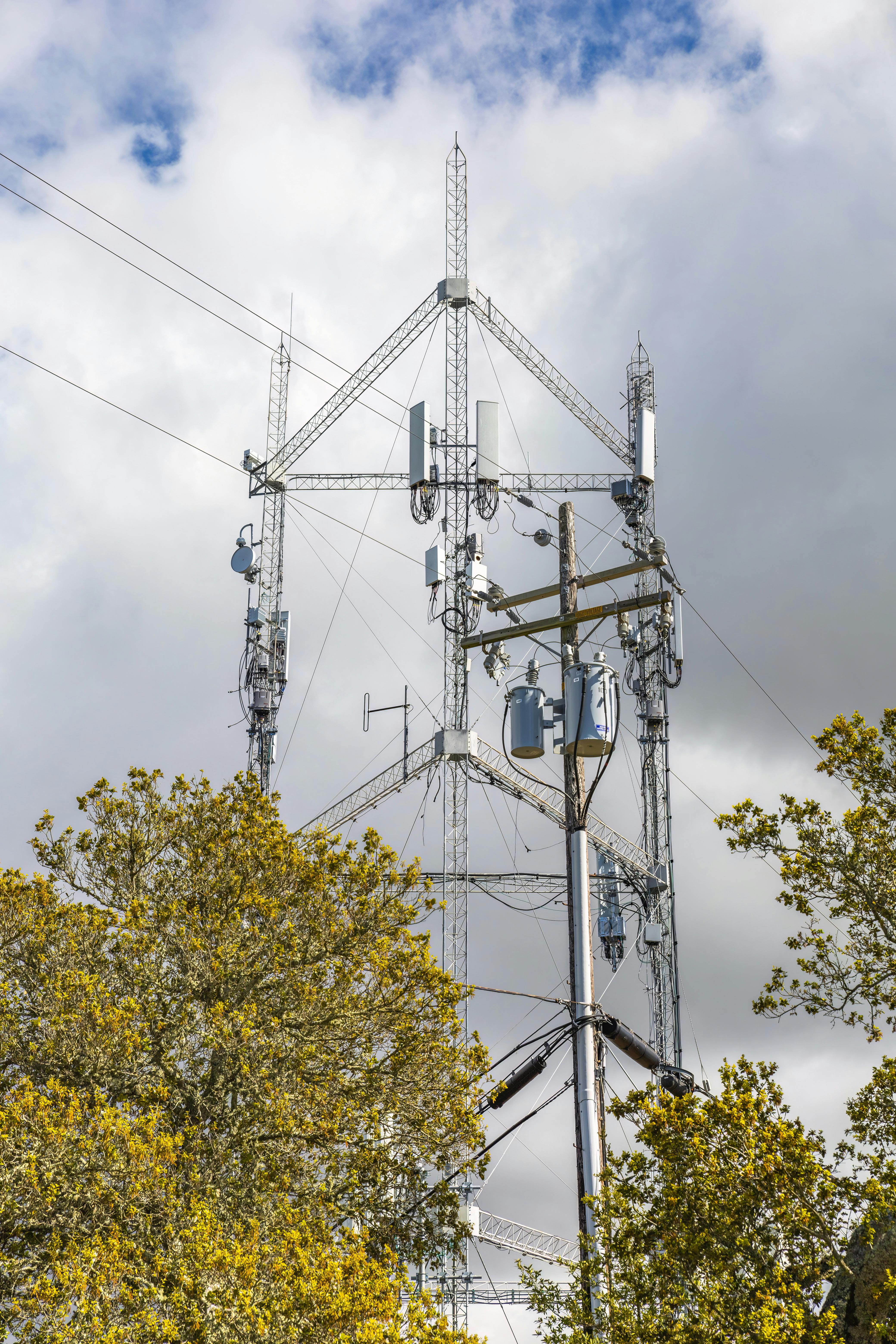White Cloud over Transmission Tower · Free Stock Photo