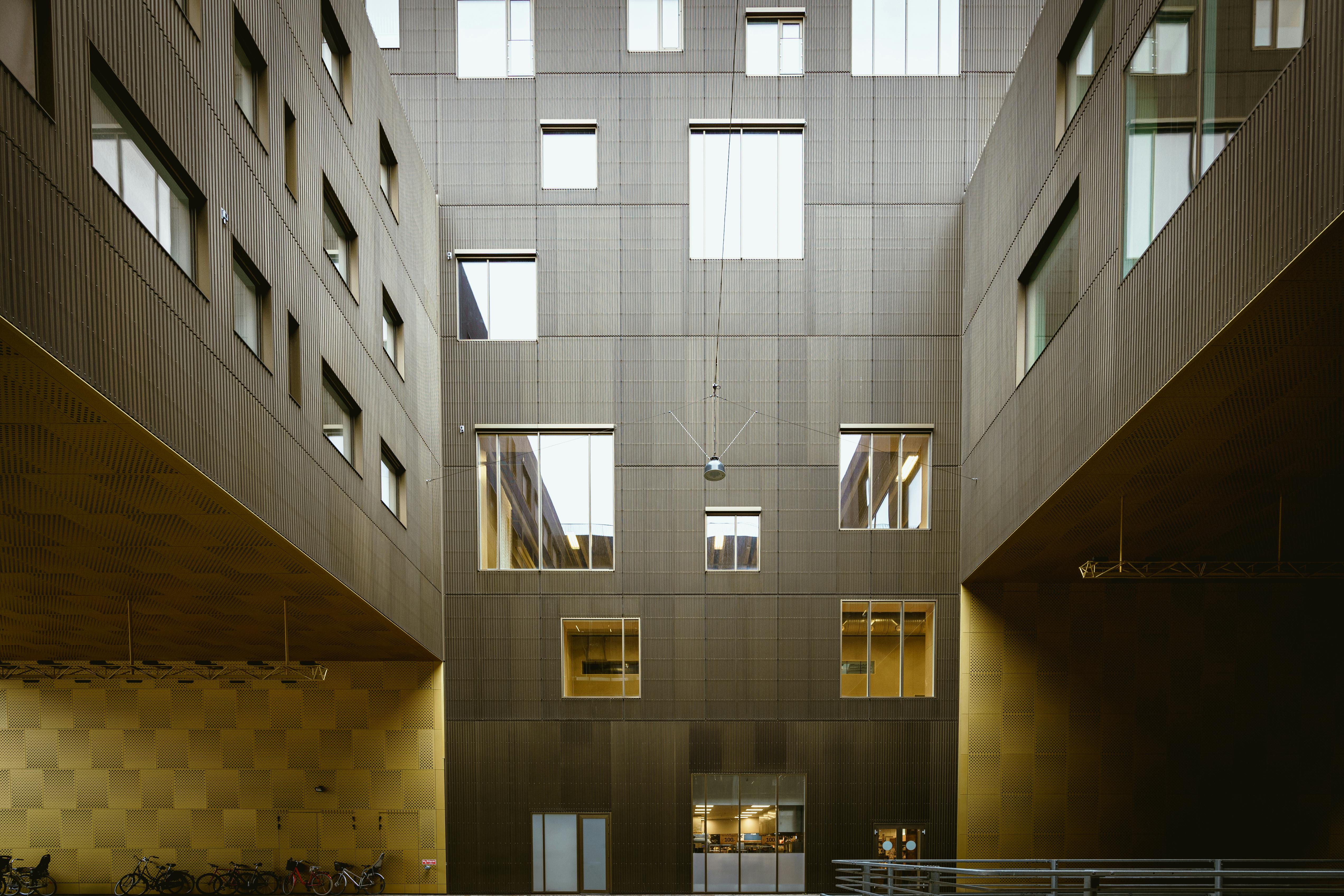 Windows on Building Walls · Free Stock Photo