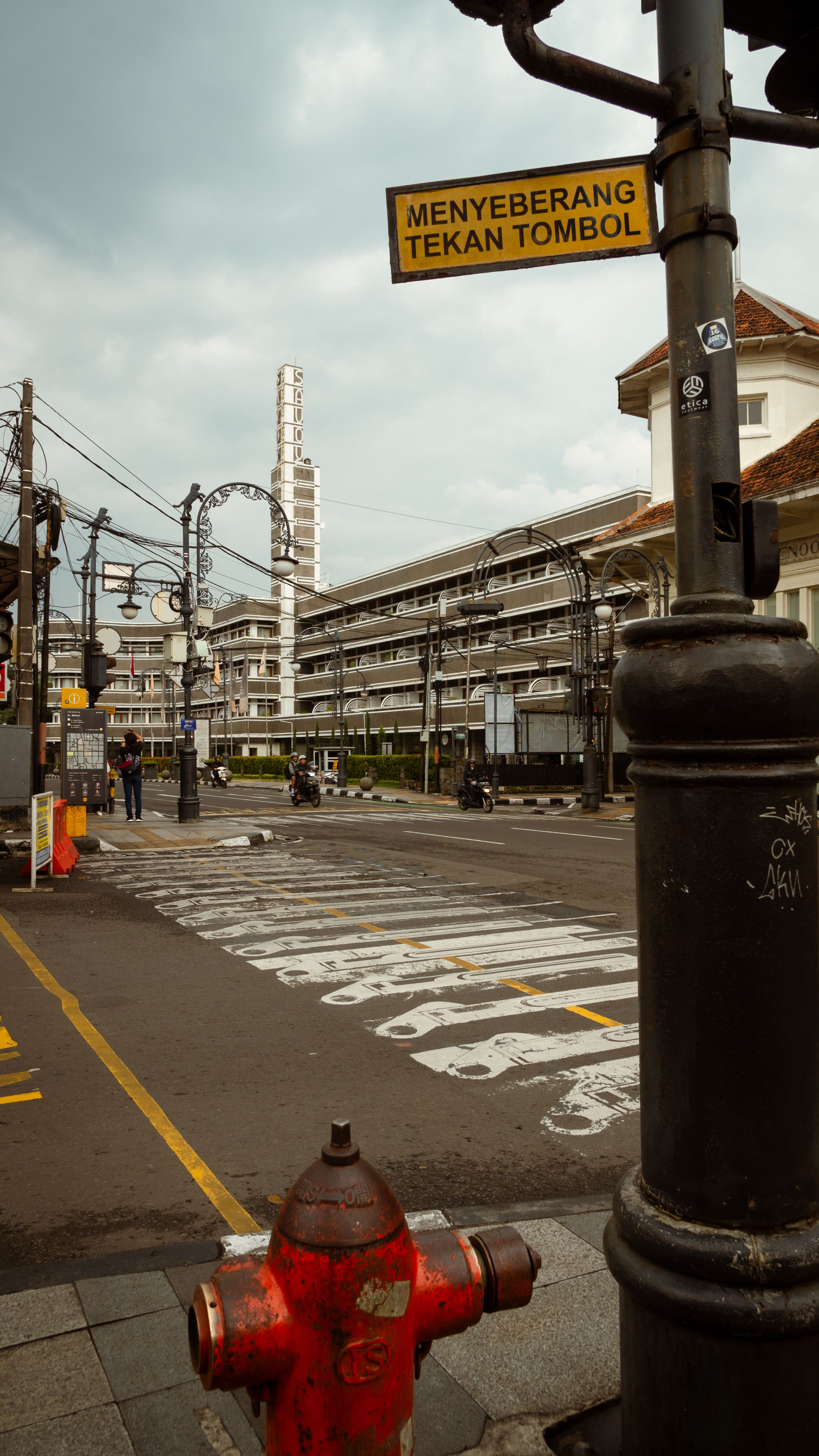 Yellow Sign on Pole by Pedestrian Crossing in Bandung, Indonesia · Free ...