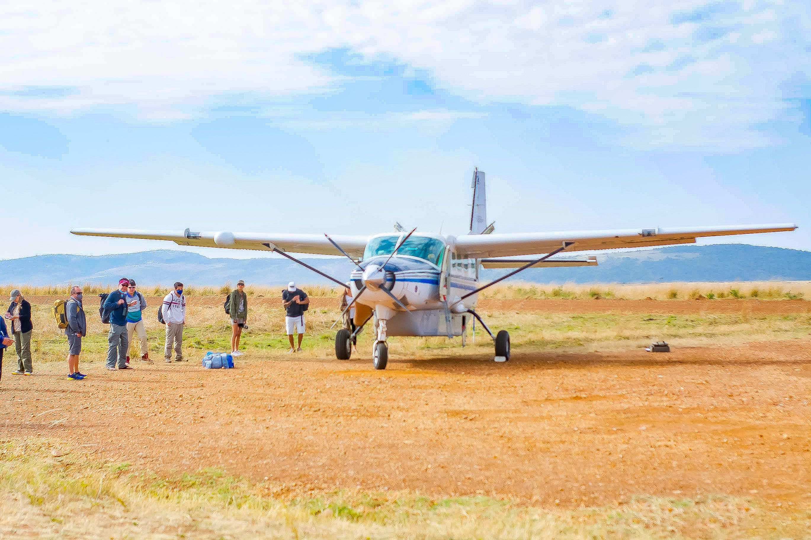 Passengers Waiting on Airstrip by Airplane · Free Stock Photo