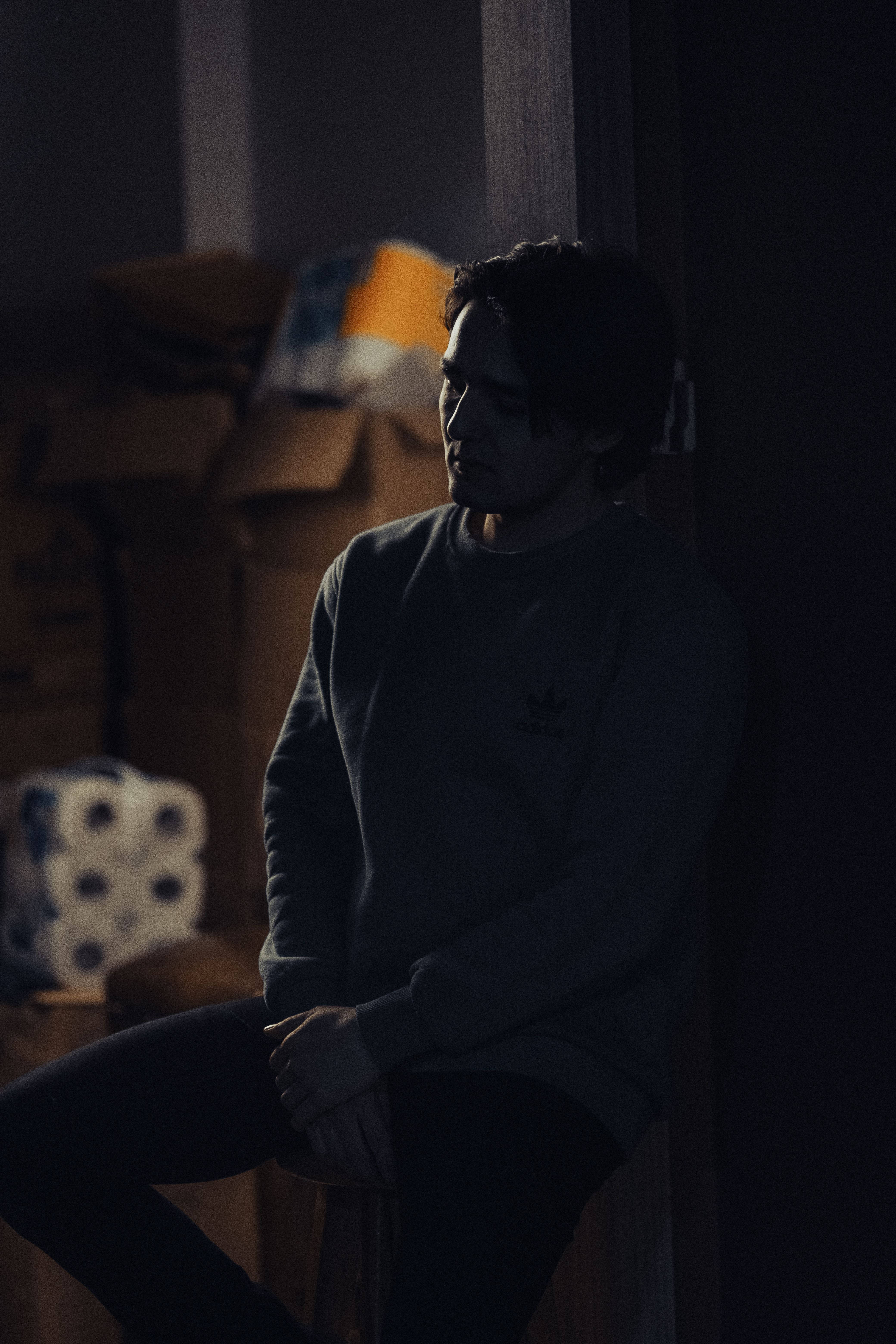 Man Sitting in Shadow · Free Stock Photo