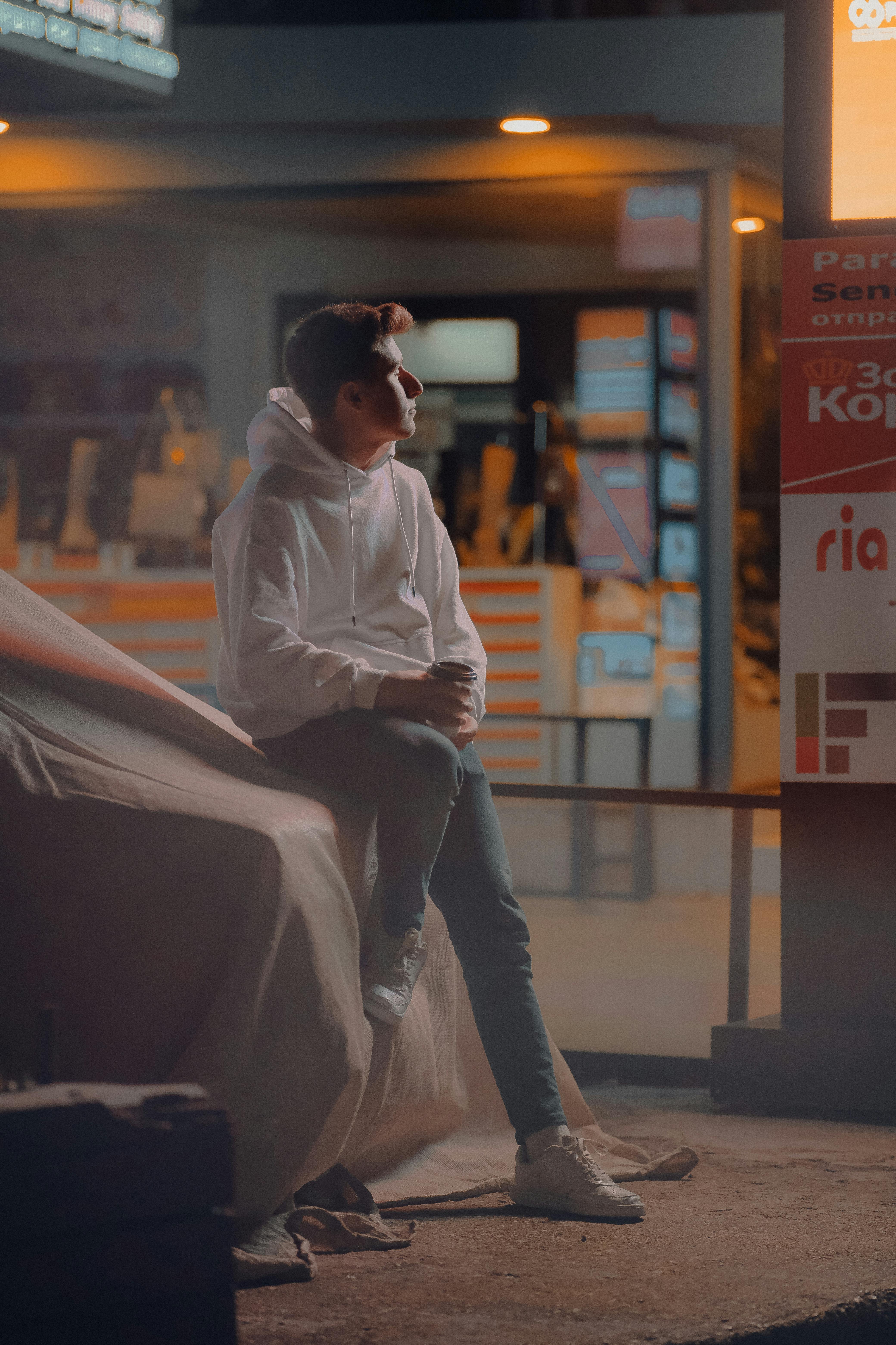 Man Posing in Hoodie · Free Stock Photo