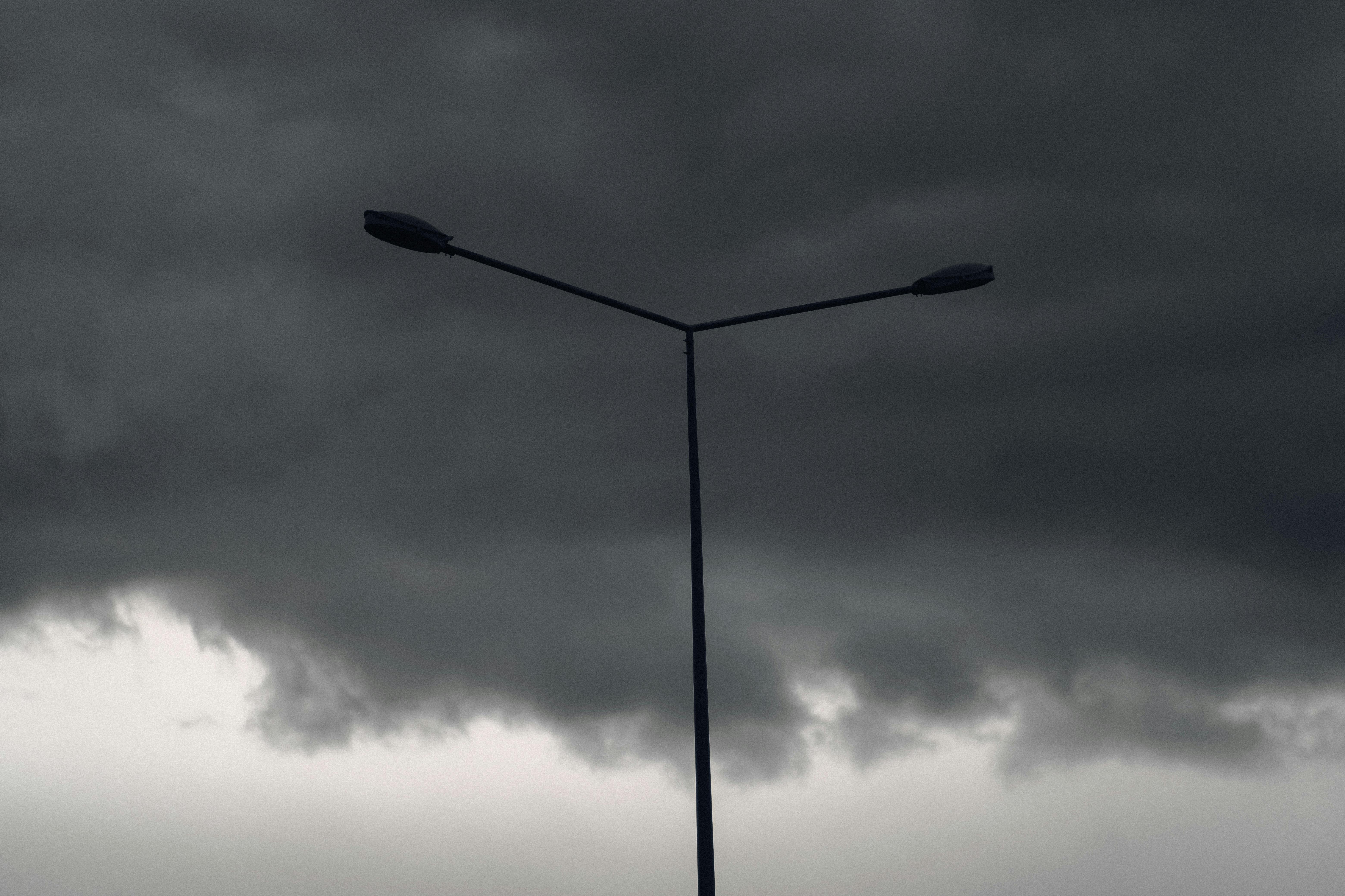 Overcast over Street Lamp · Free Stock Photo