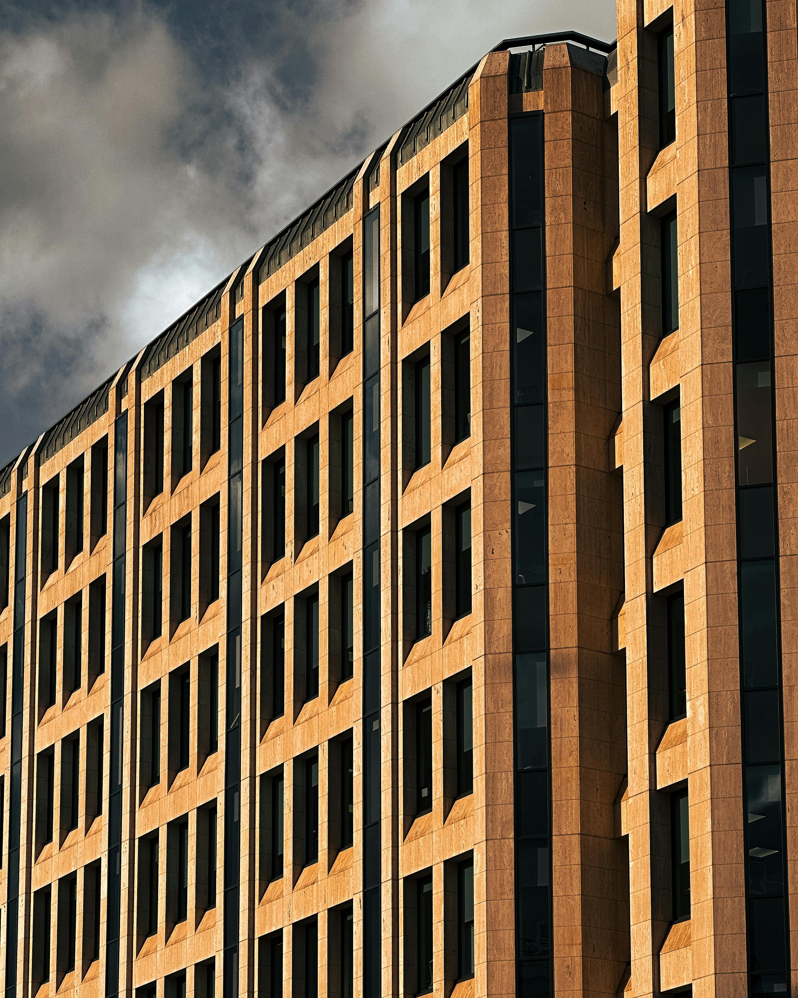 Sunlit Building Wall · Free Stock Photo