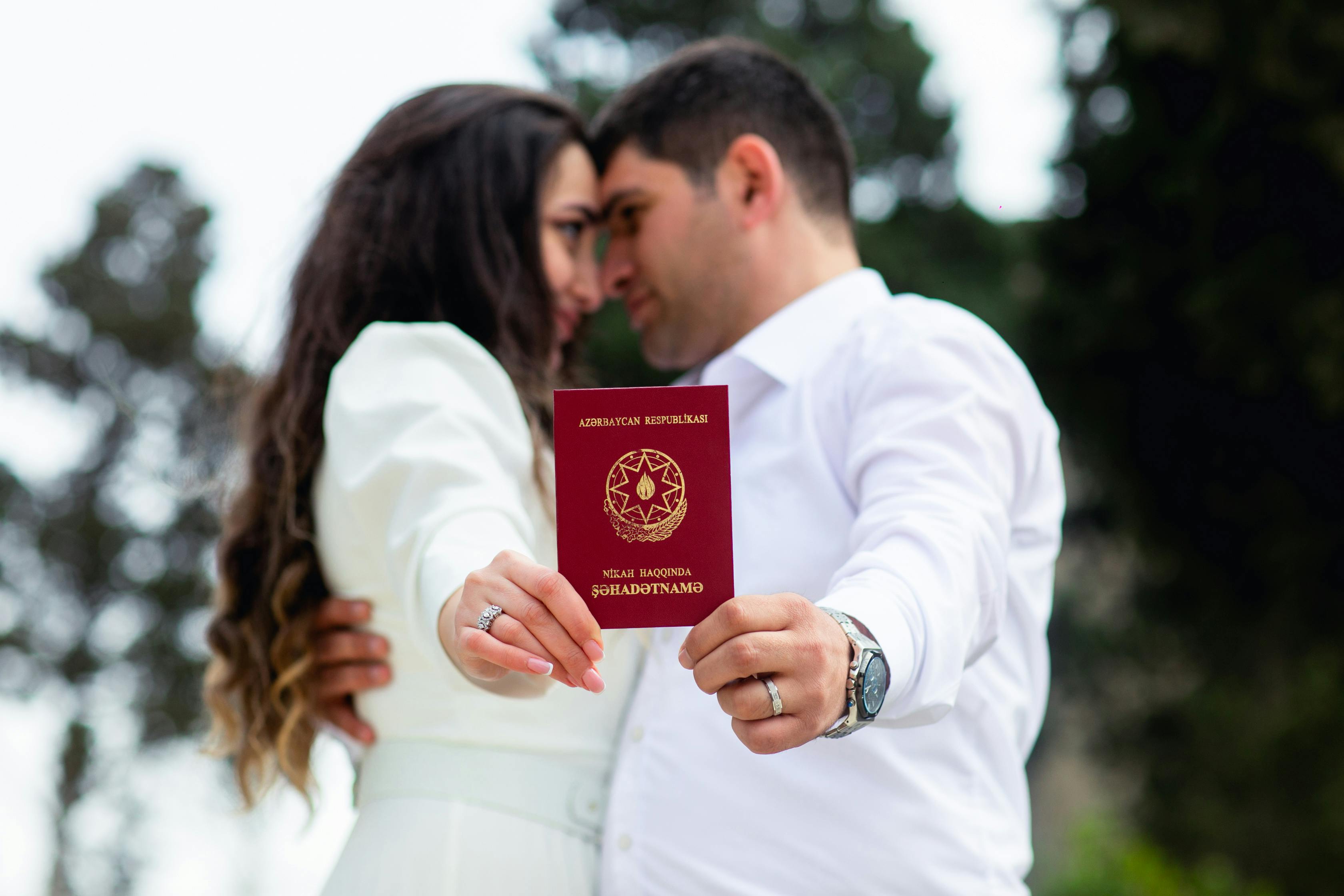 Couple Holding a Passport · Free Stock Photo