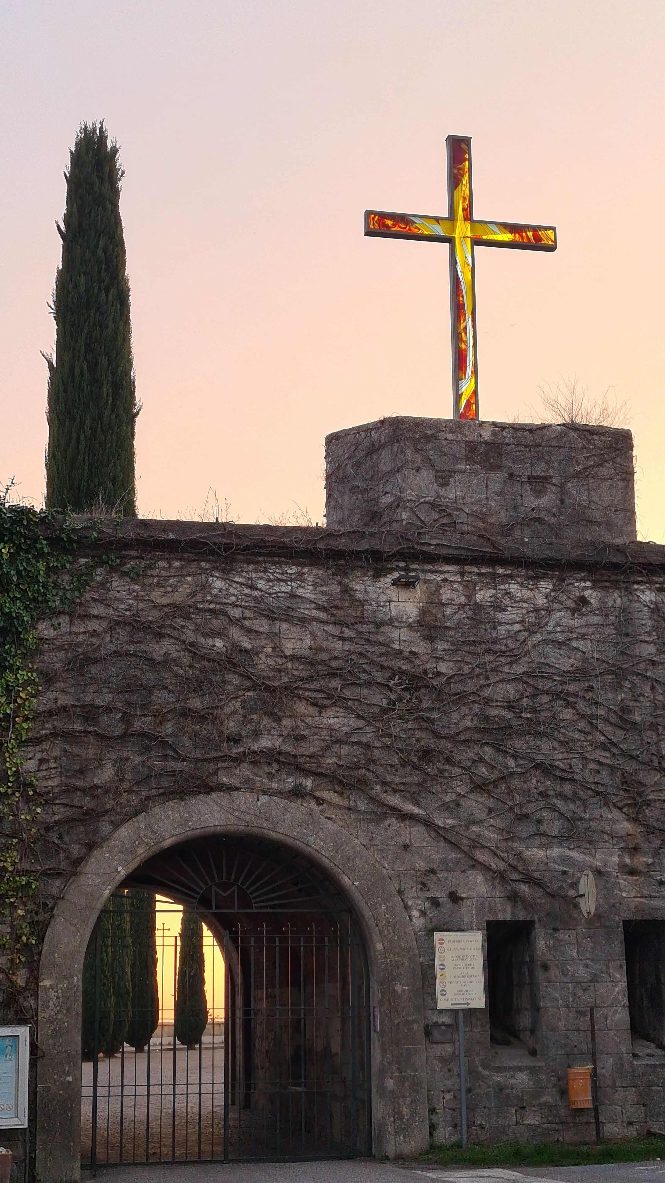 Cross on the Entrance Gate of a Church · Free Stock Photo