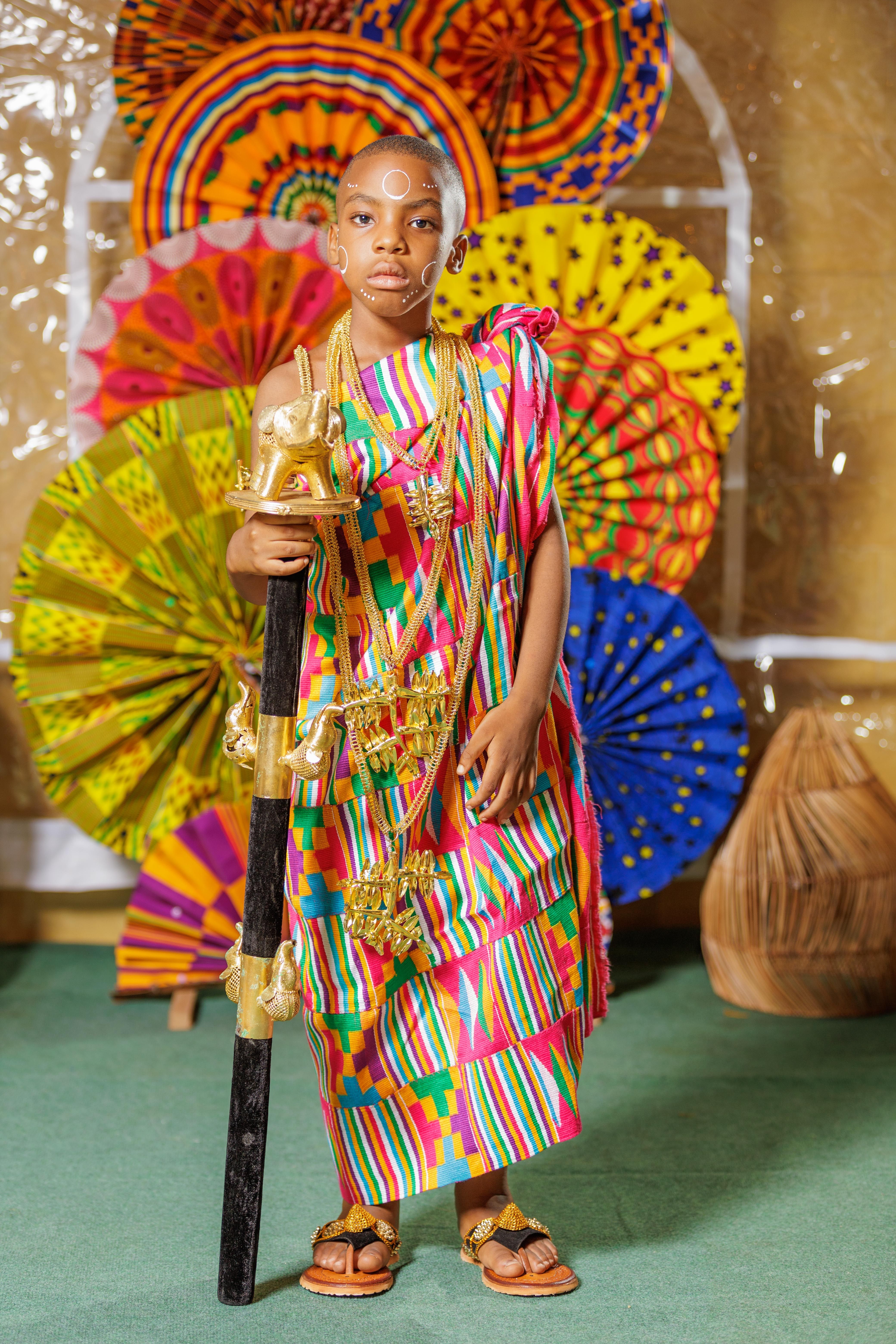 A Girl in Traditional Colorful Gown and Jewelry · Free Stock Photo