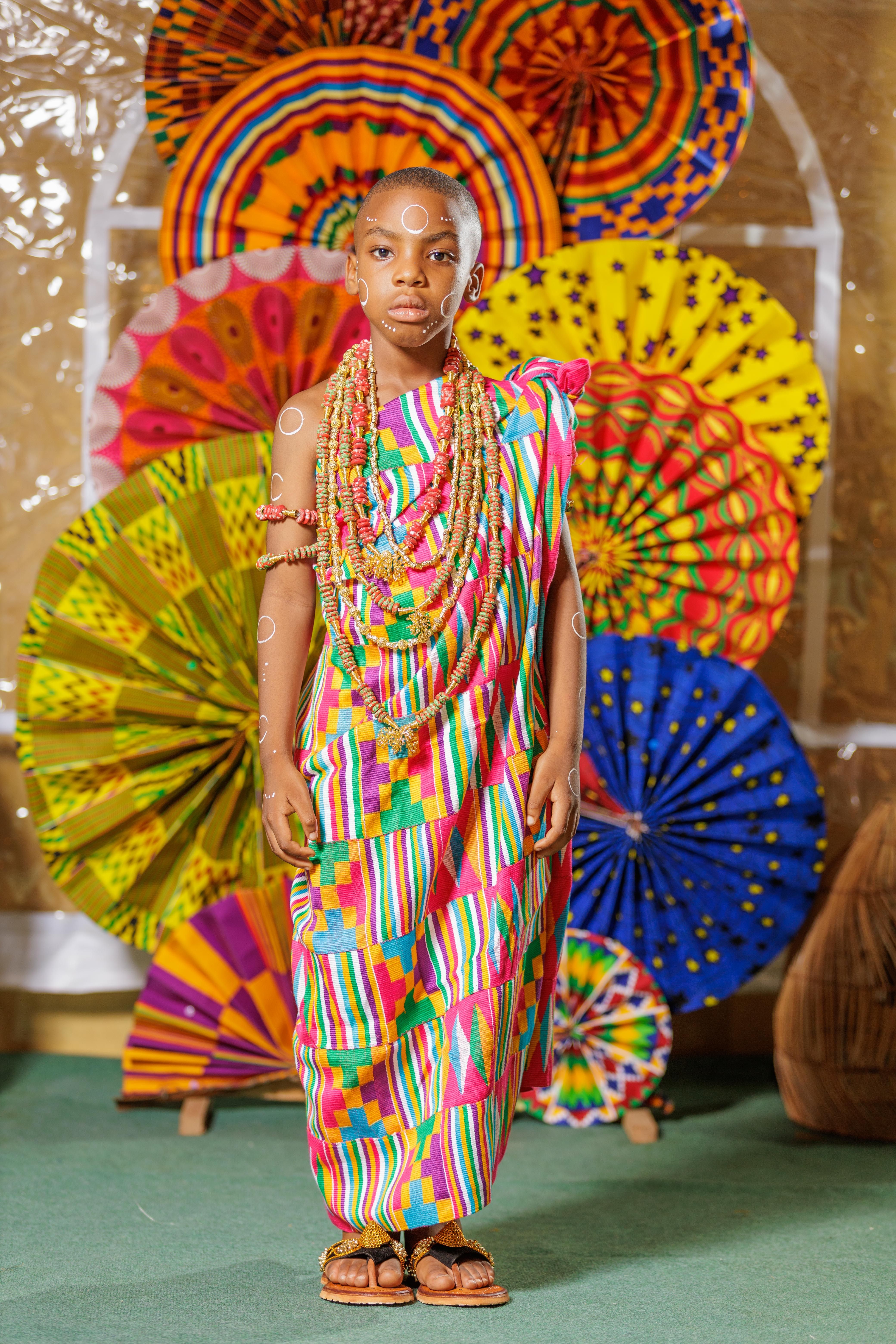 A Girl in Traditional Colorful Gown and Jewelry · Free Stock Photo