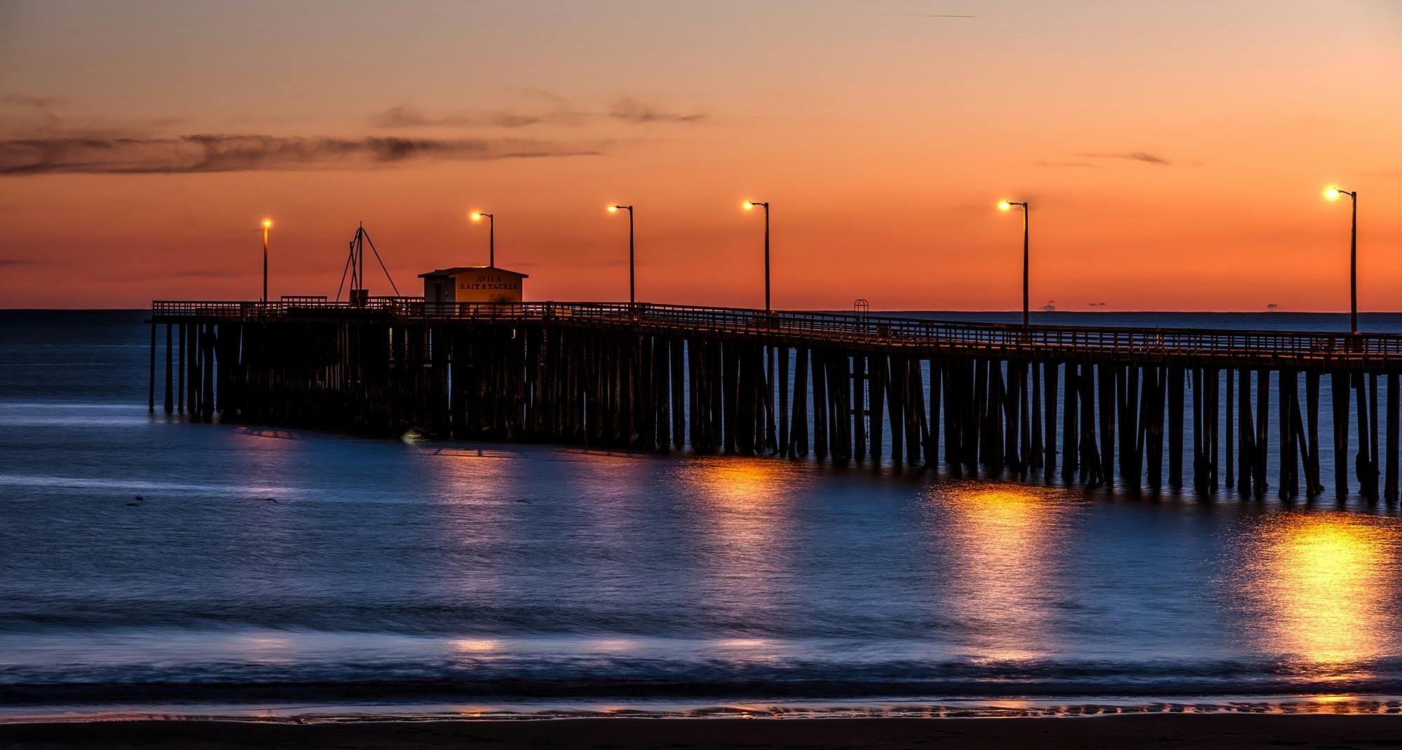 Wooden Dock on Sea Shore With Light Post during Sunset · Free Stock Photo