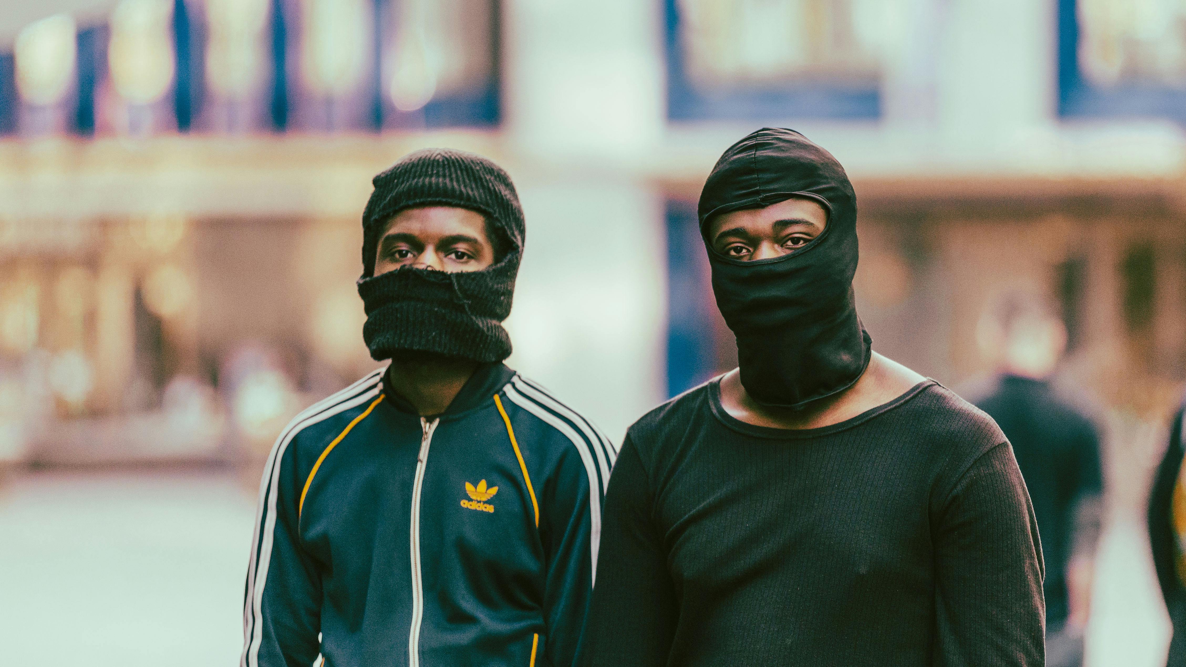 Photo of Two Men Wearing Balaclavas · Free Stock Photo