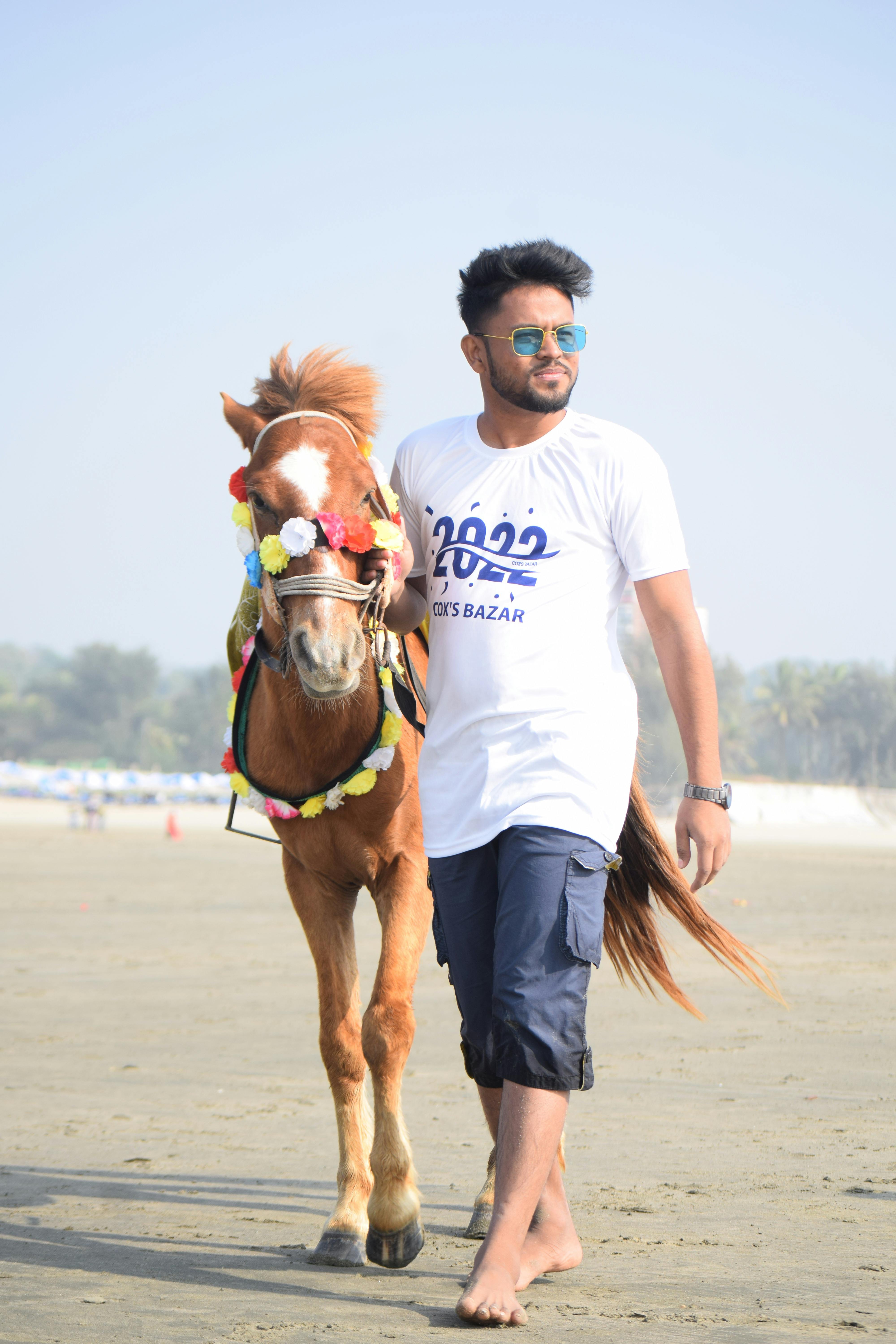 A Man with a Pony · Free Stock Photo