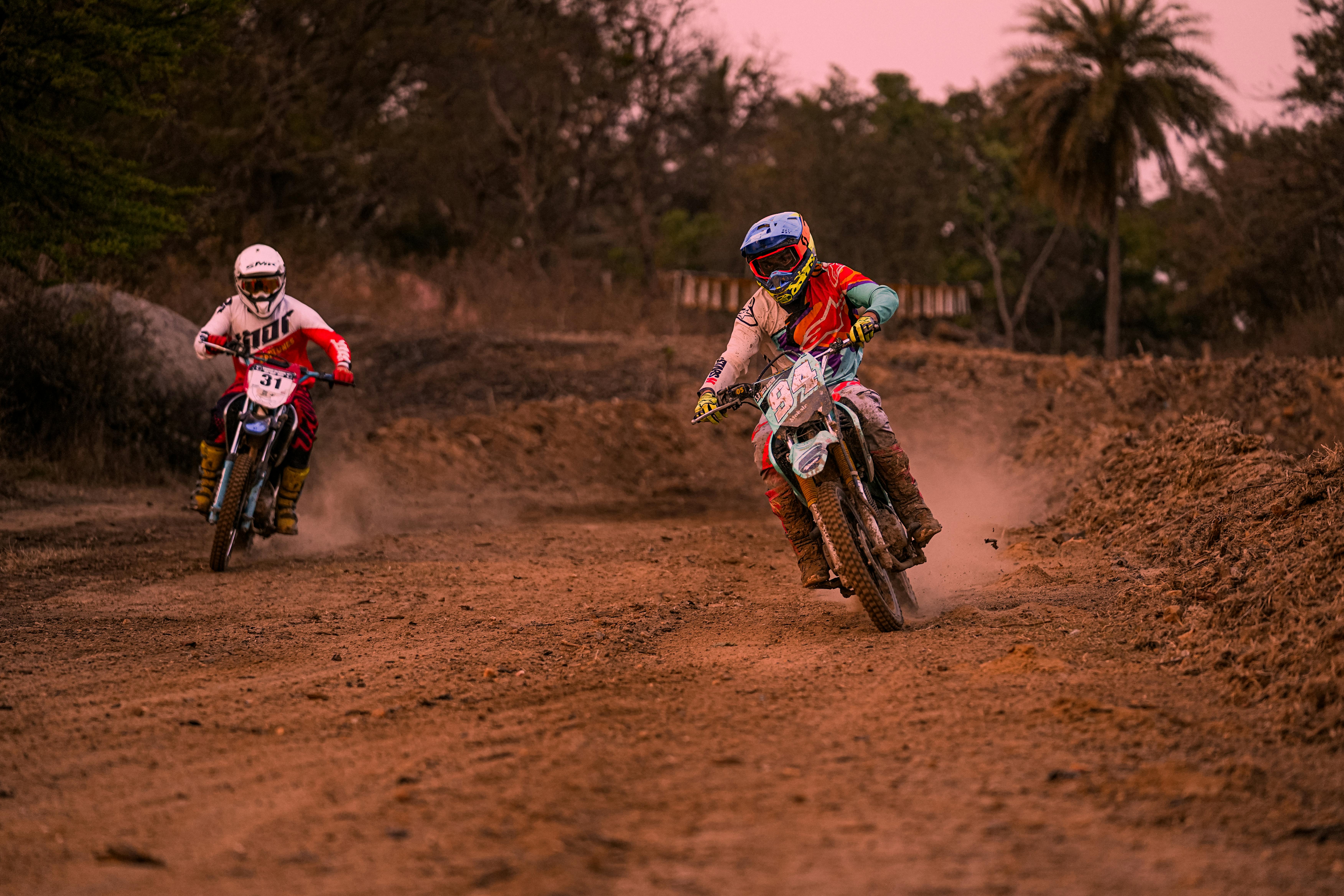 Man Riding Motocross Dirt Bike on Track · Free Stock Photo
