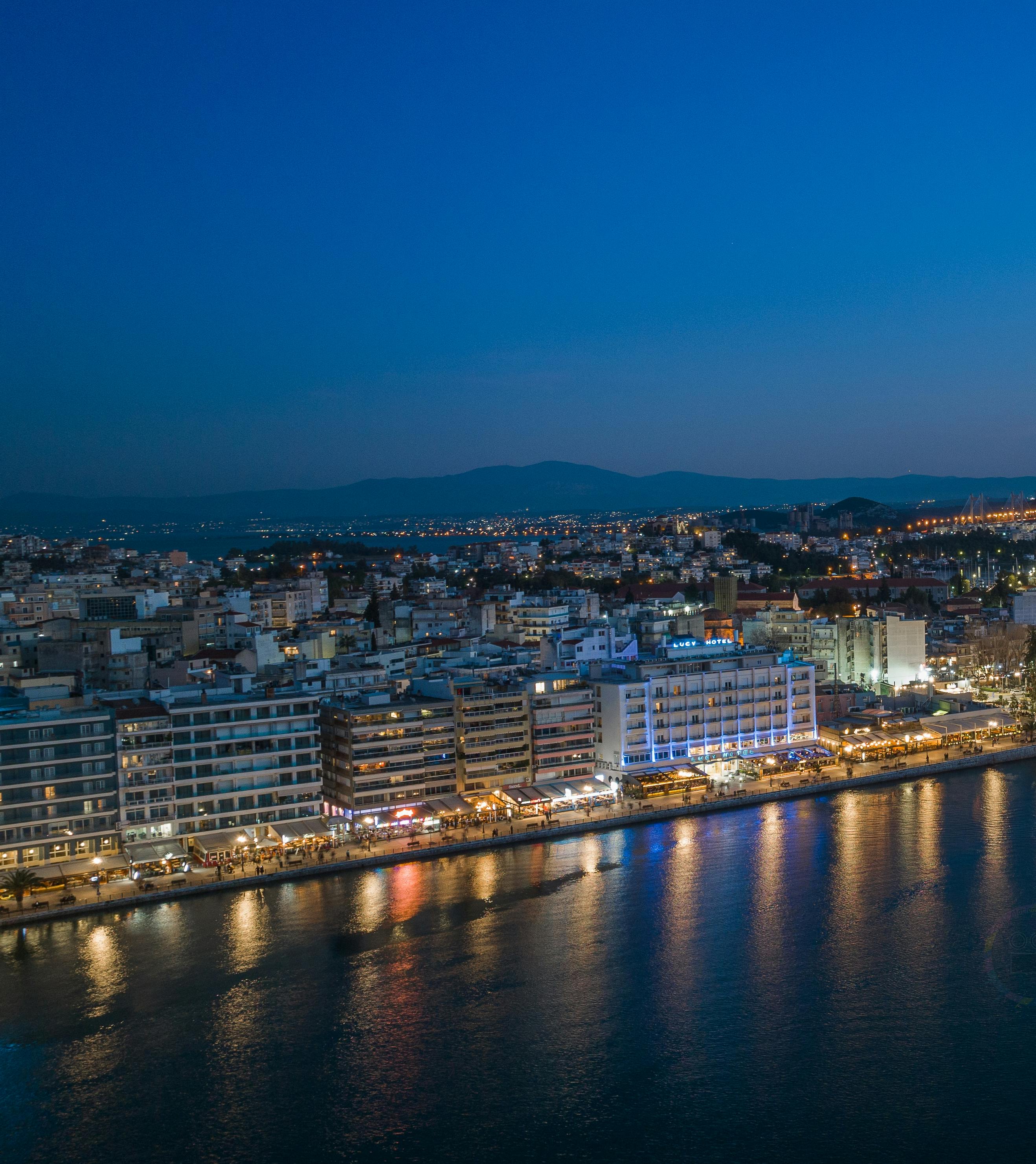 Aerial View of Illuminated Buildings and the Shore of Chalkida, Greece ...