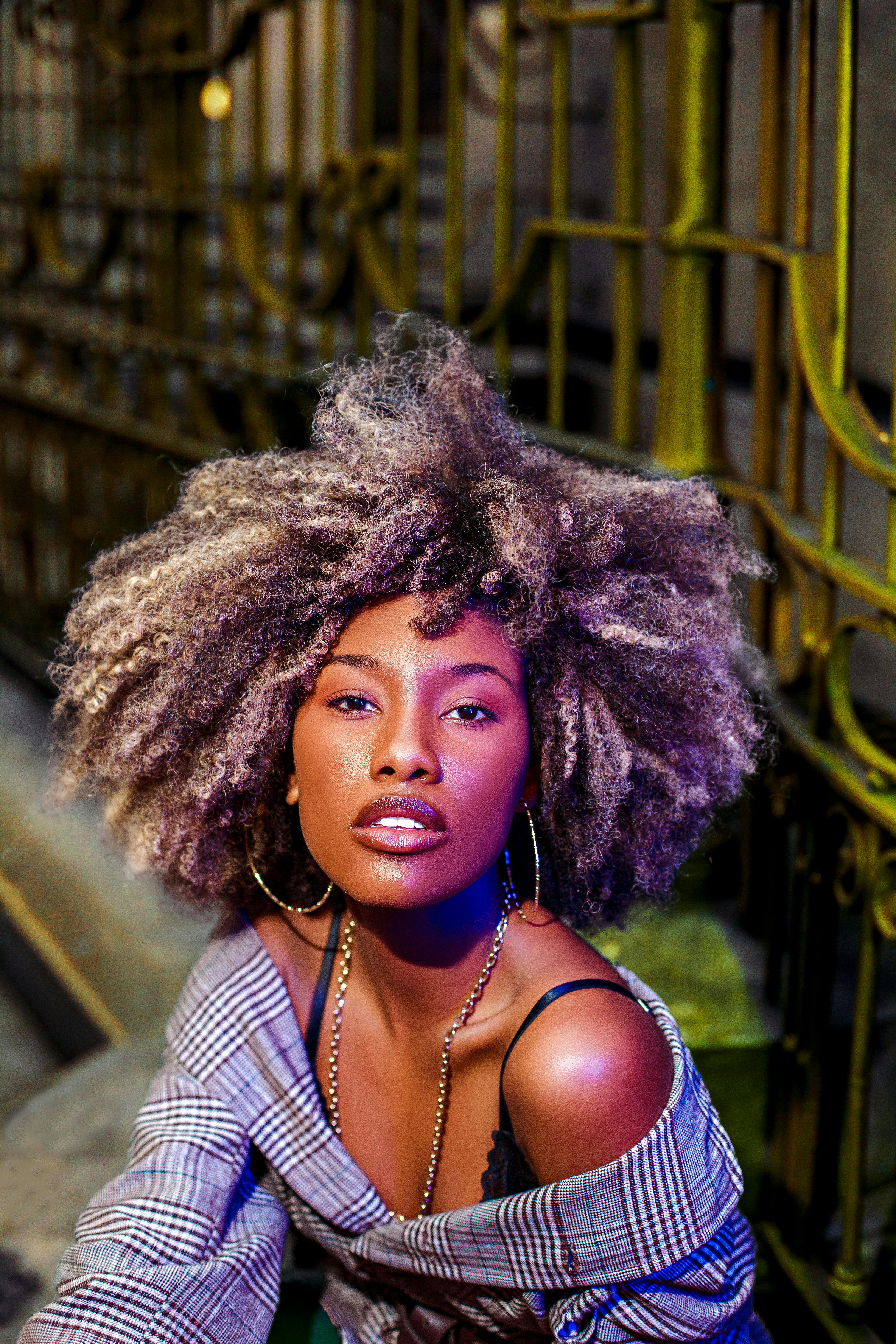 Portrait of a Young Woman with Afro Hair · Free Stock Photo