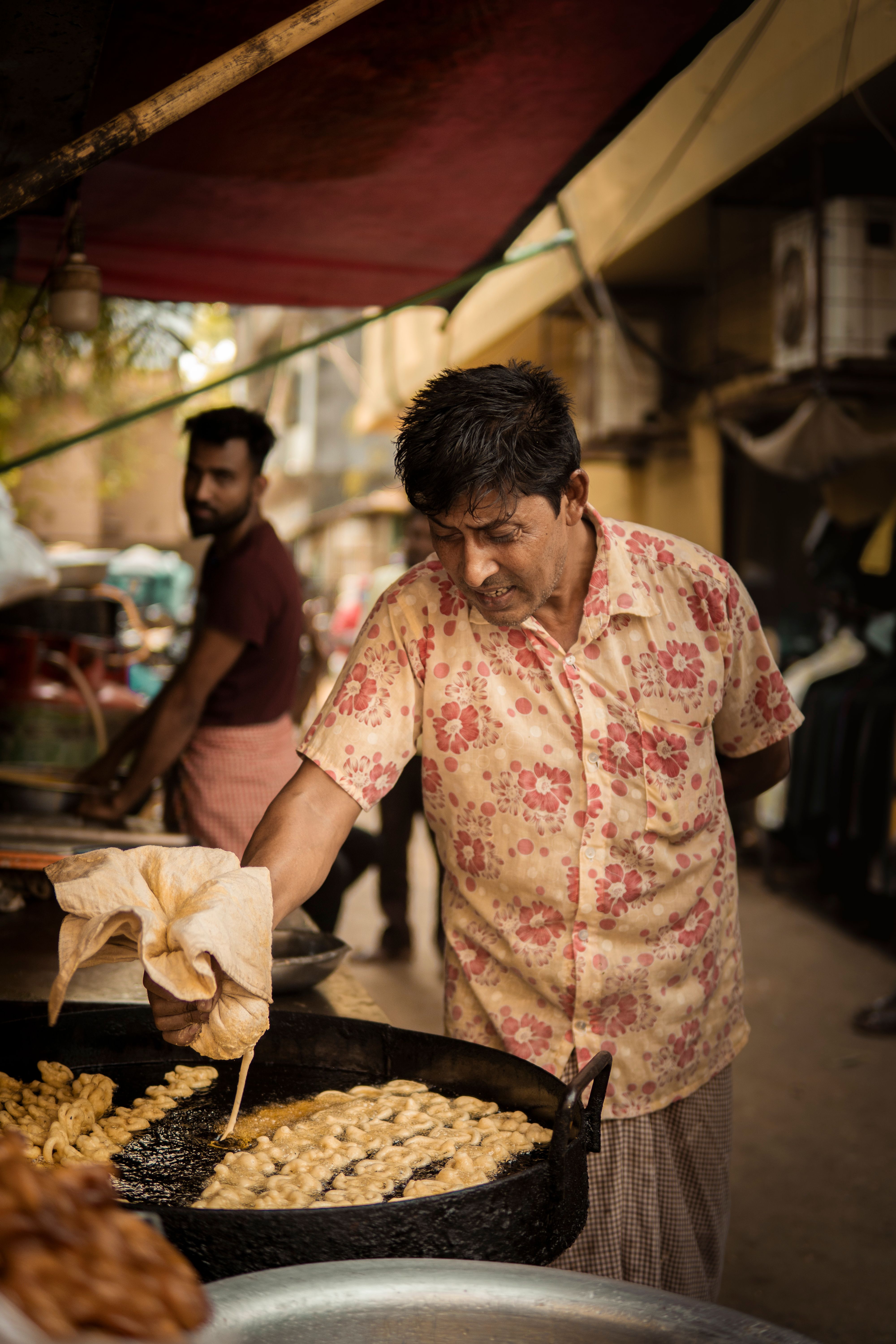 Man Cooking Traditional Food on the Street Market · Free Stock Photo