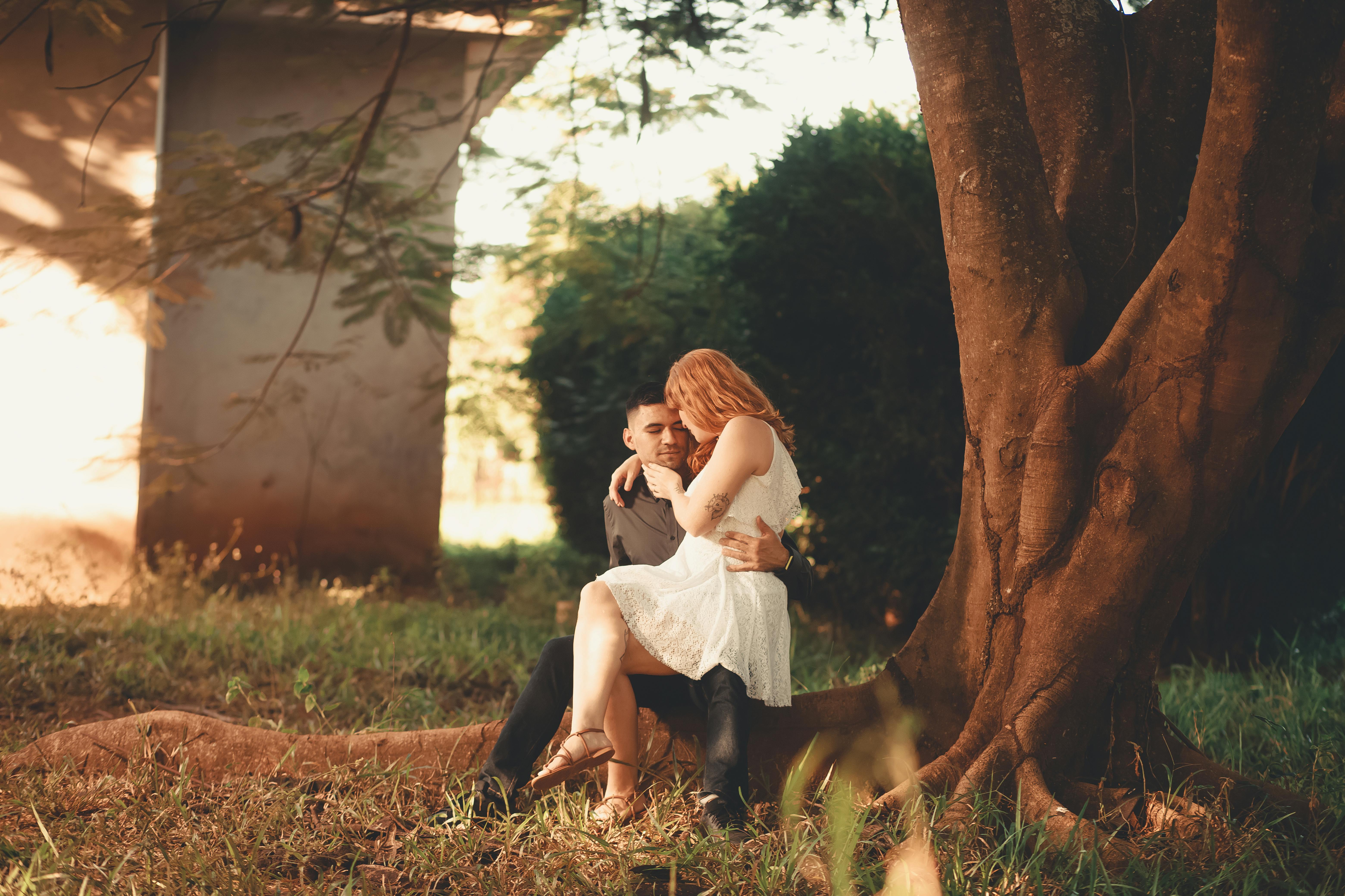 Couple Sitting Under a Tree · Free Stock Photo