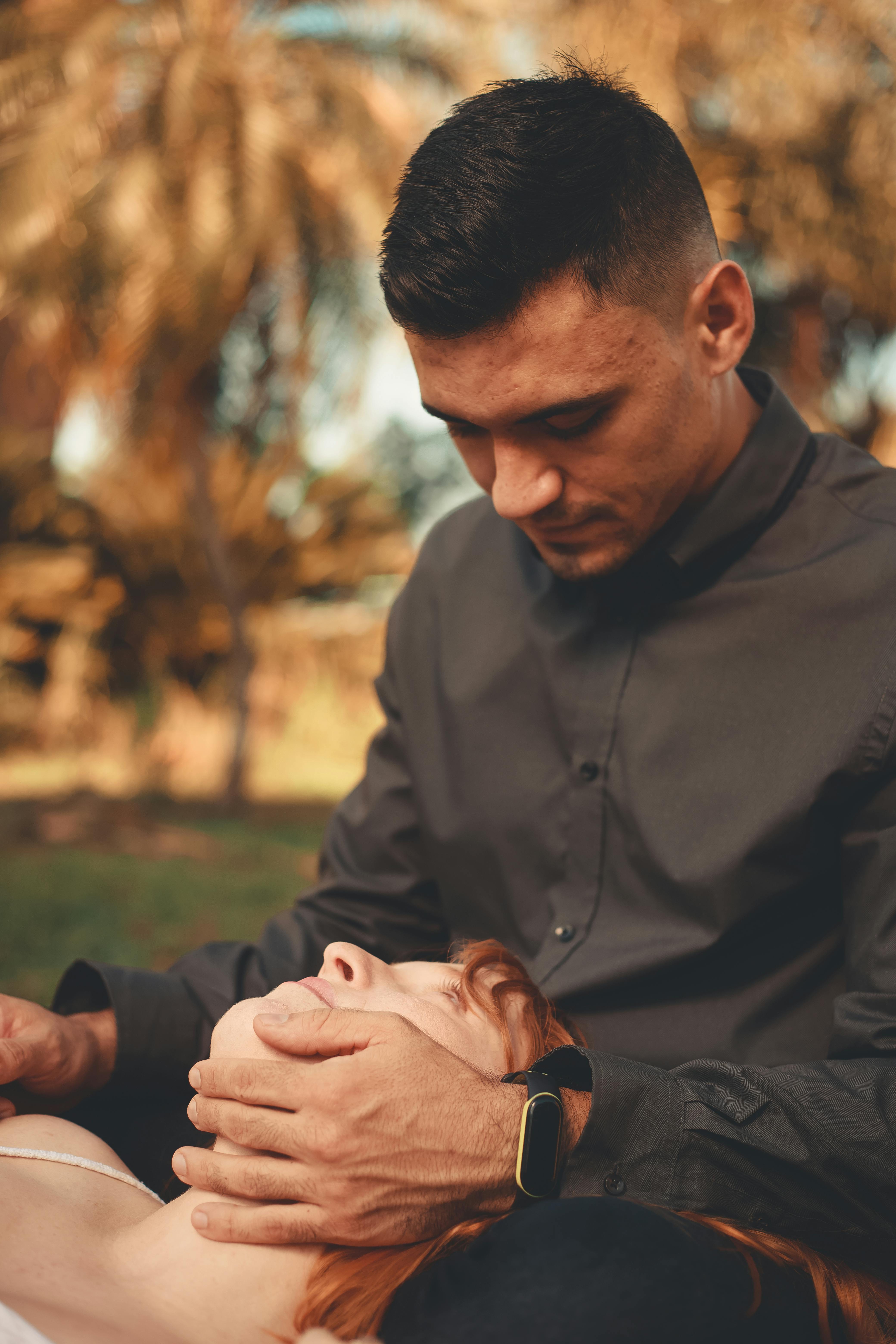 Woman in Green Top Lying on a Man's Chest in Bed · Free Stock Photo