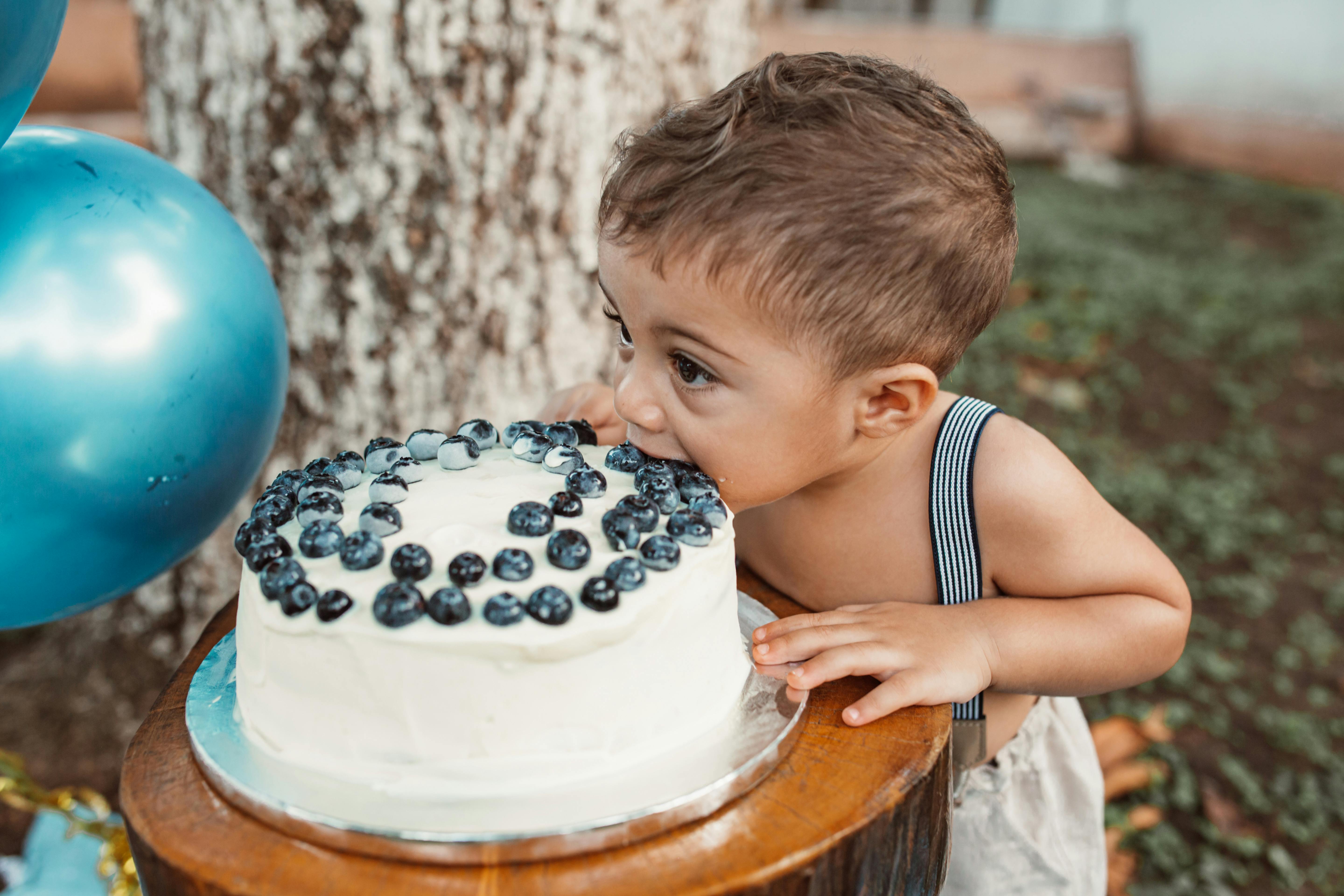 Boy Eating Cake · Free Stock Photo