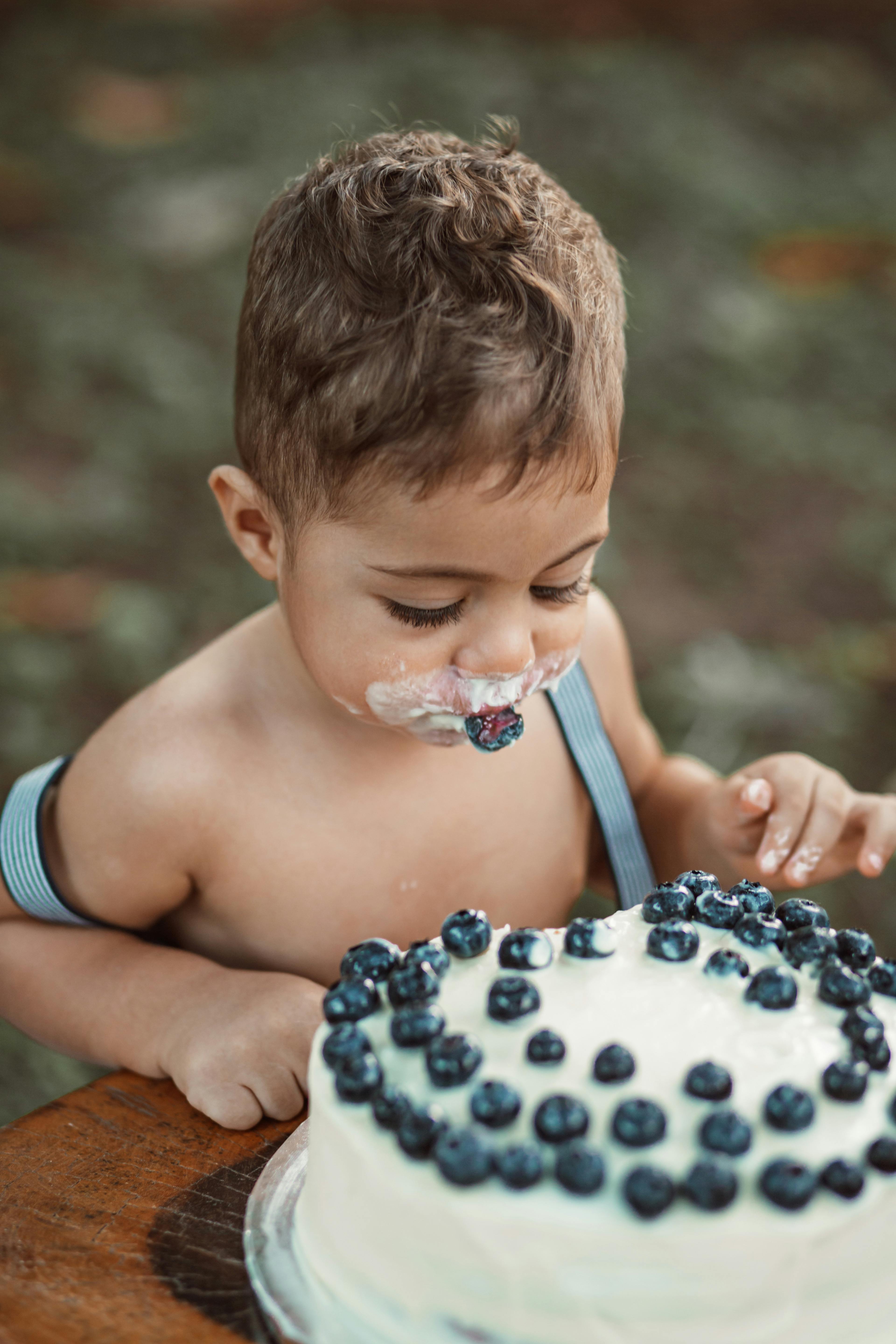 Little Boy Eating Cake · Free Stock Photo