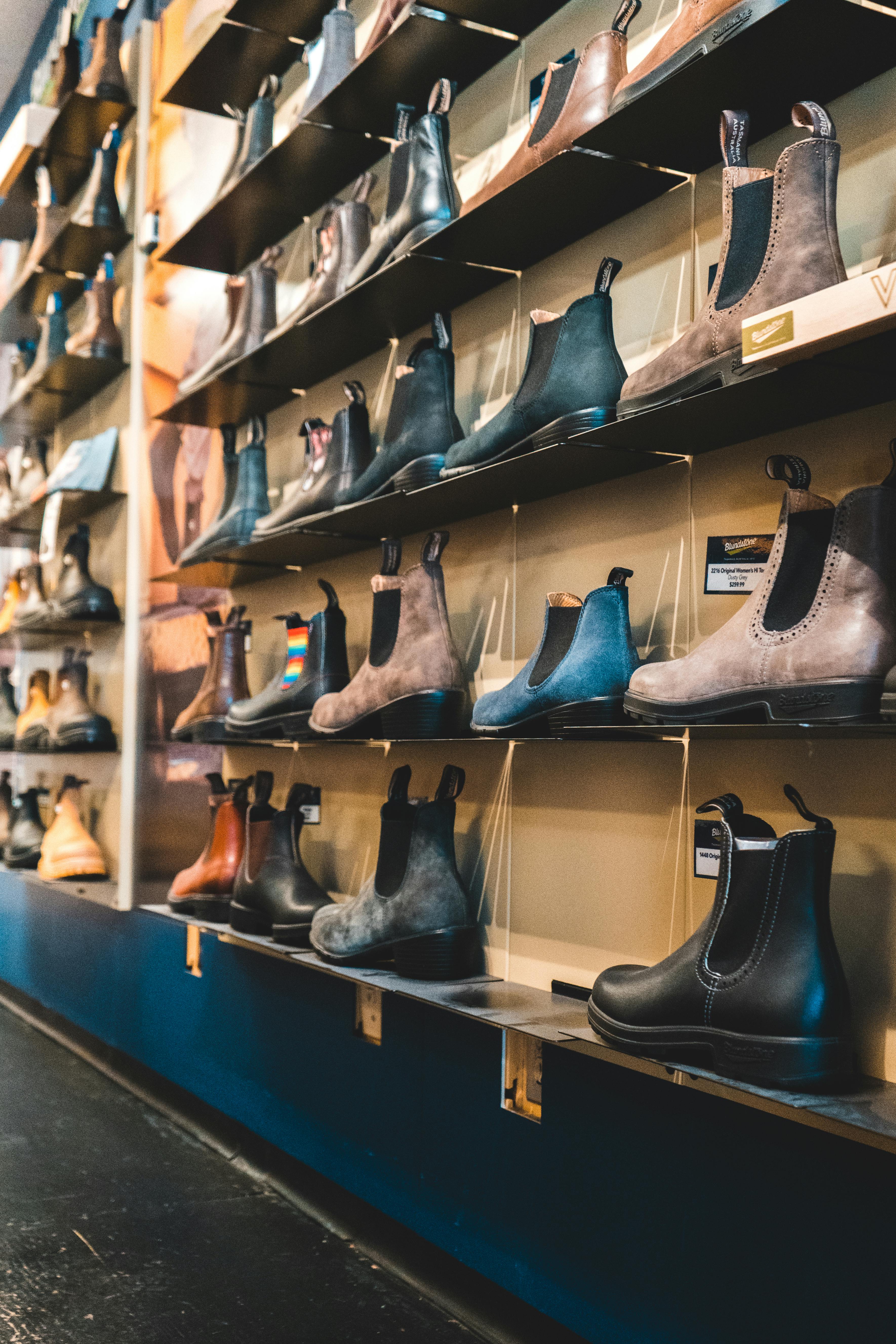 Boots on Display in Shelf at Store · Free Stock Photo
