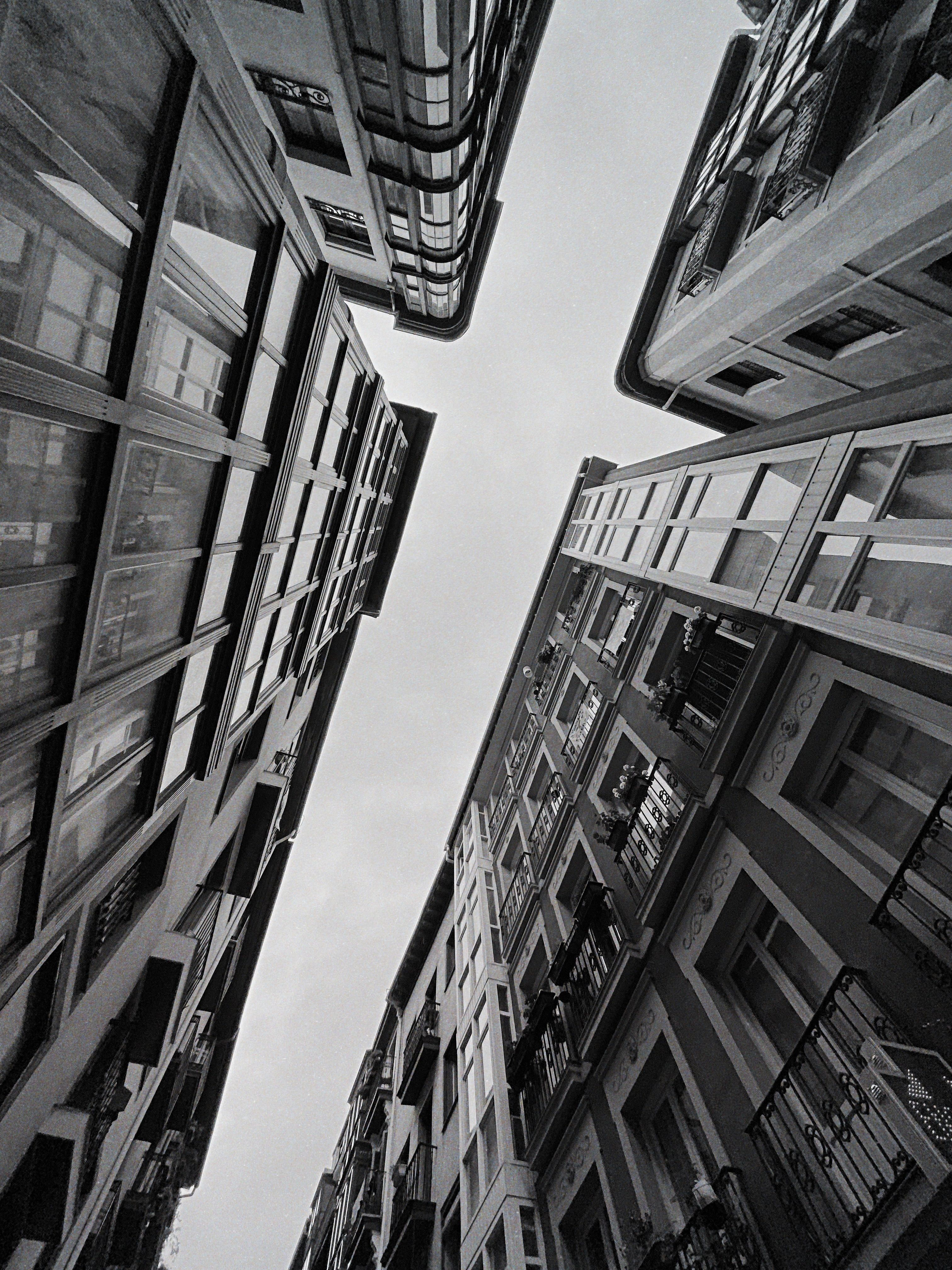 Curved Edges of Building Walls Seen from Below · Free Stock Photo