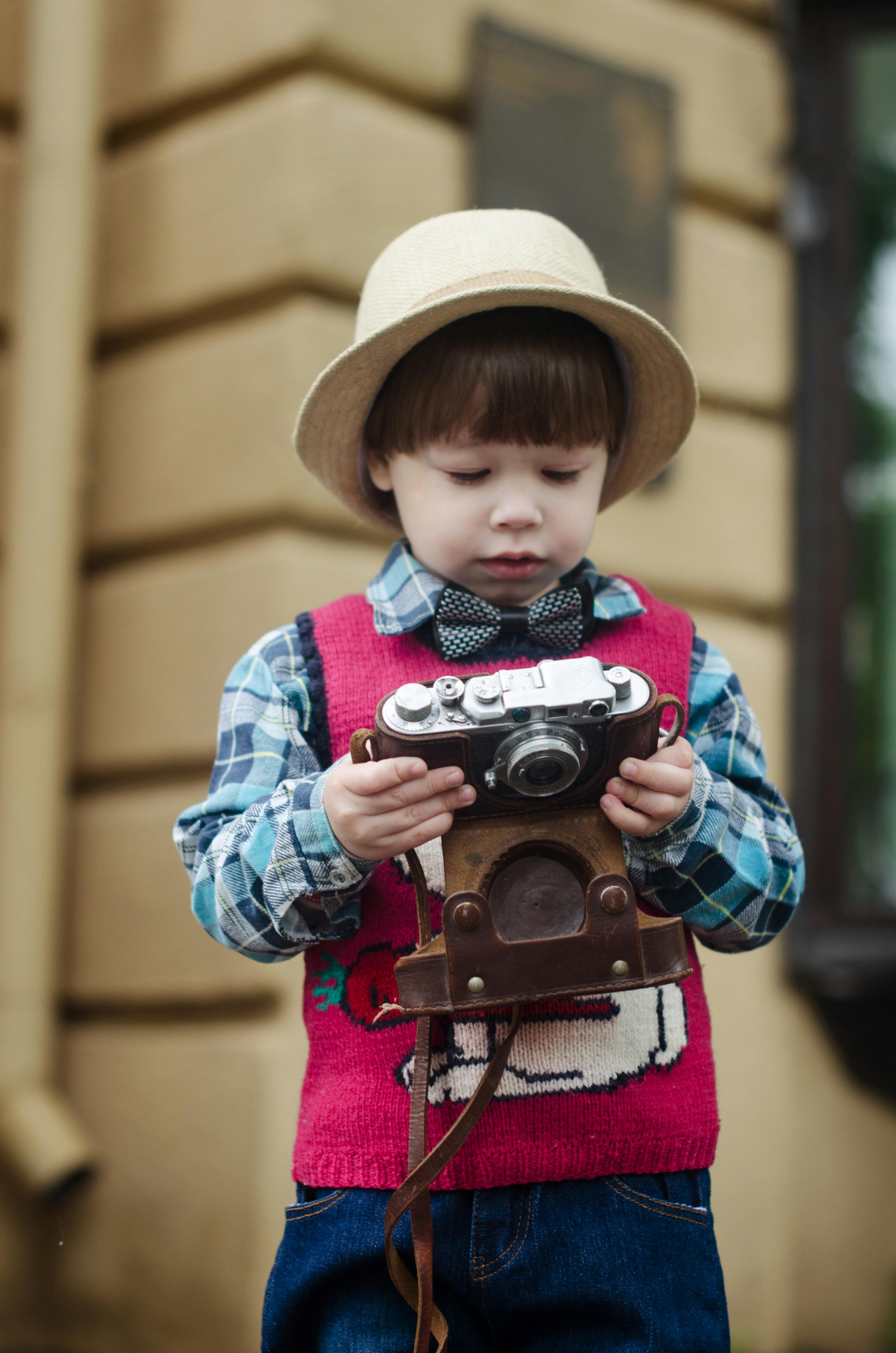 Child Holding Camera · Free Stock Photo