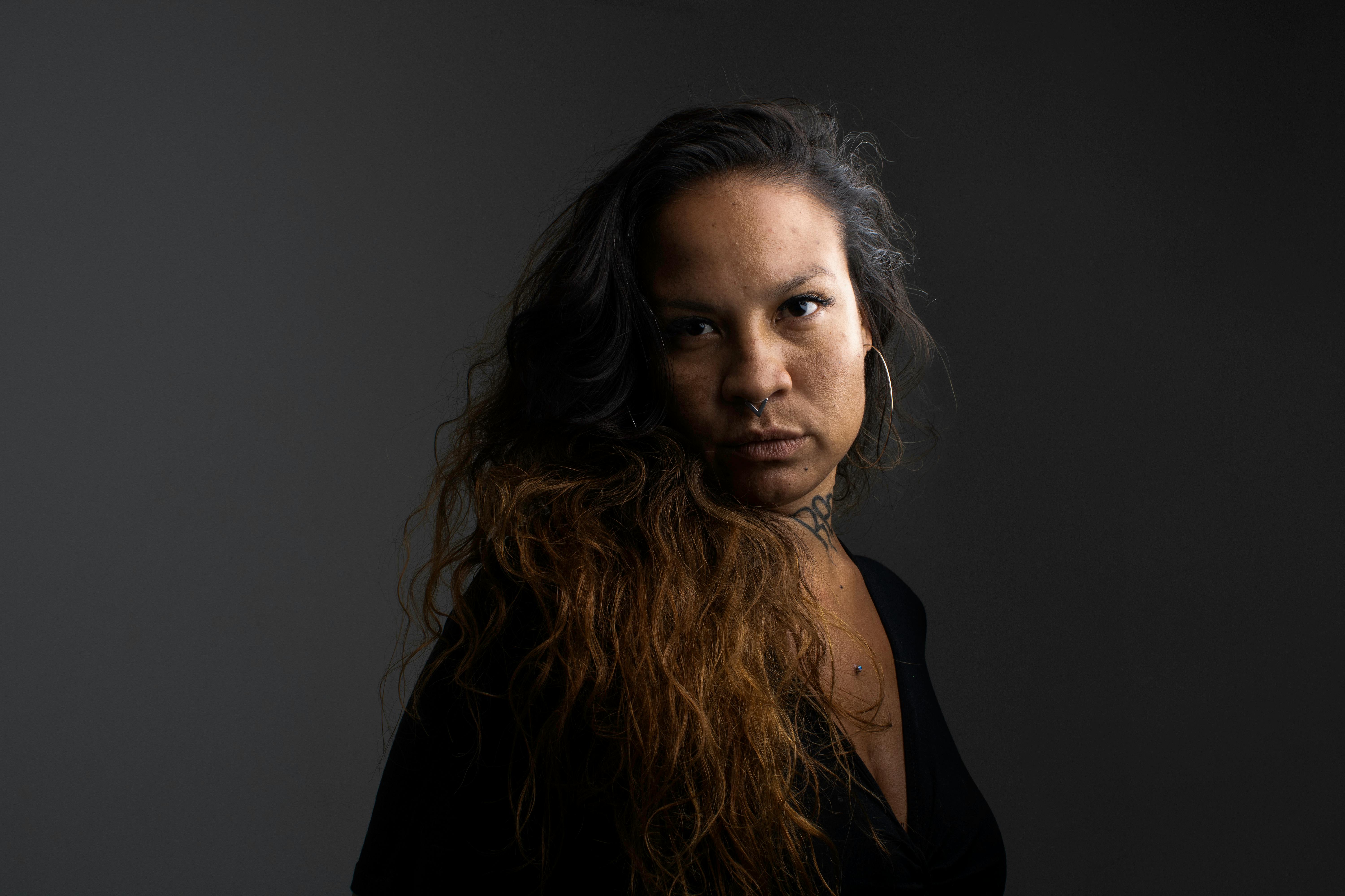 Woman behind Leaves · Free Stock Photo