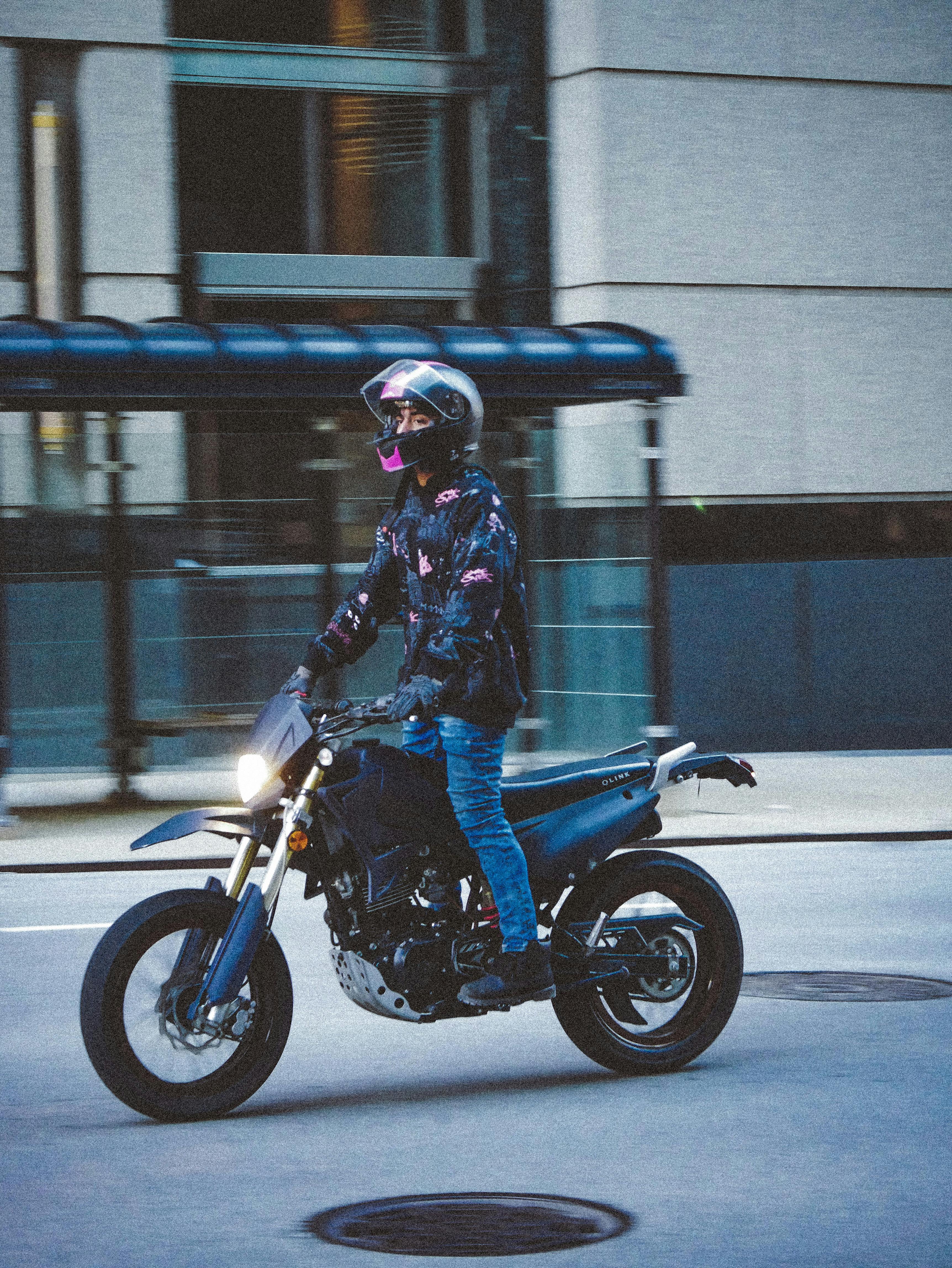 Person Standing and Posing on Riding Motorbike · Free Stock Photo