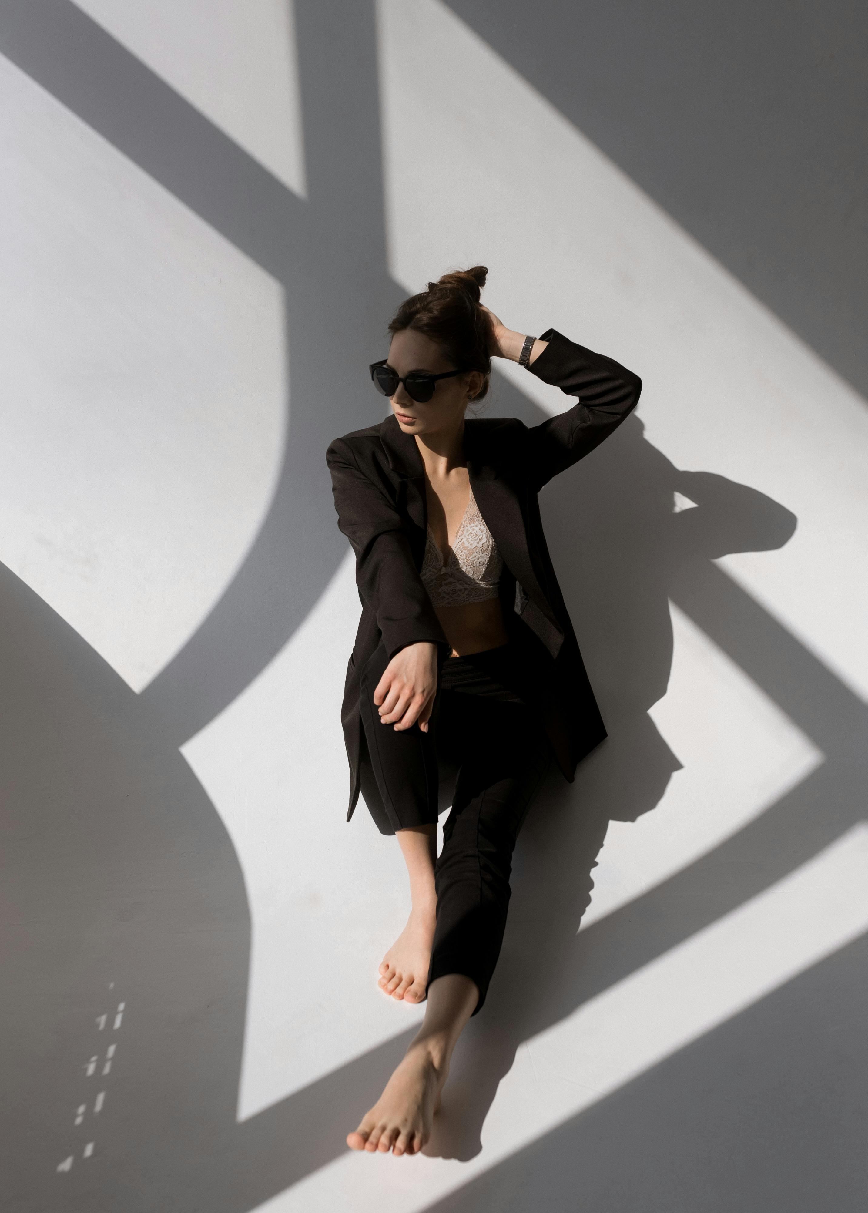 Woman in Jacket Posing with Hand in Hair · Free Stock Photo