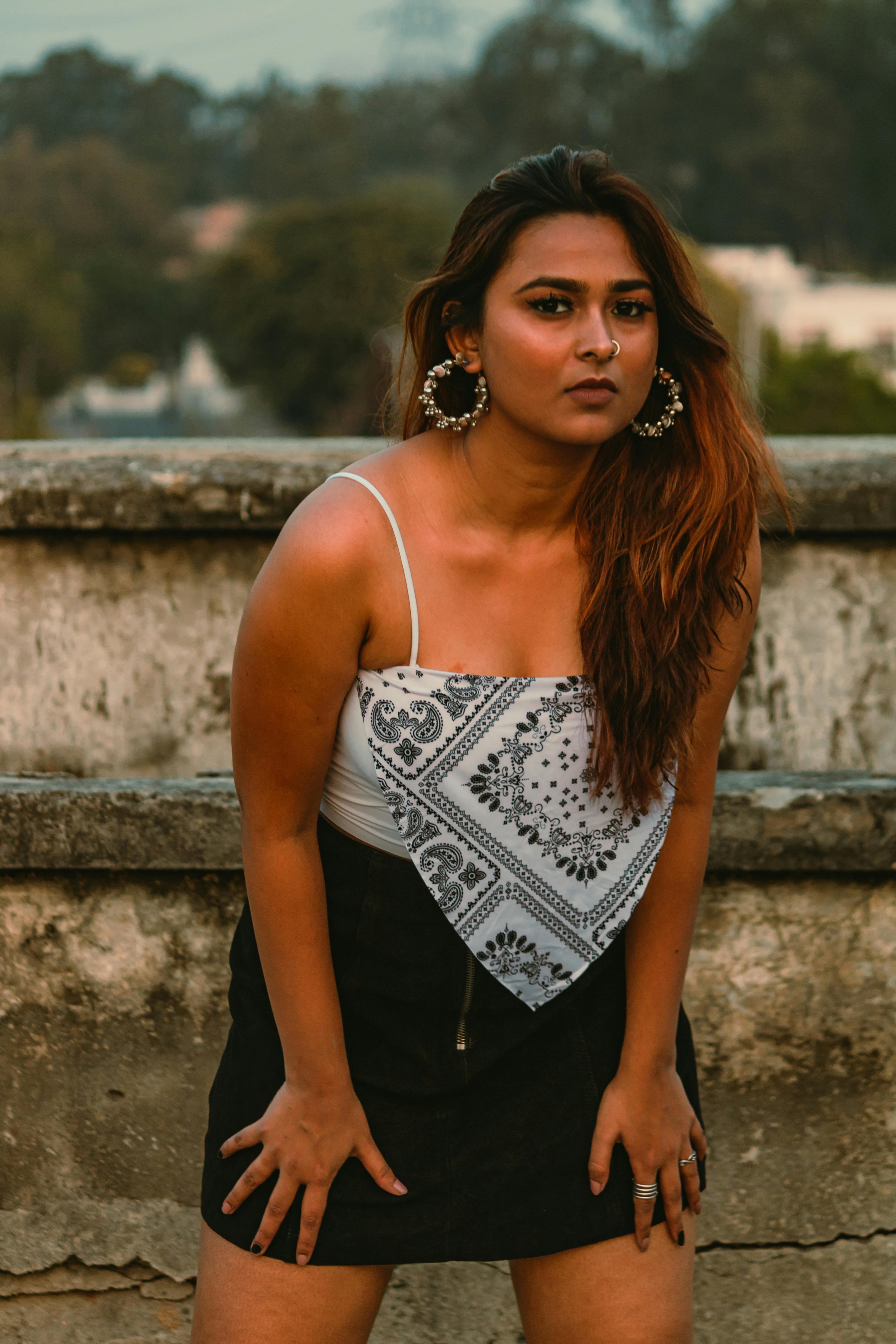 Woman Posing by Wall · Free Stock Photo