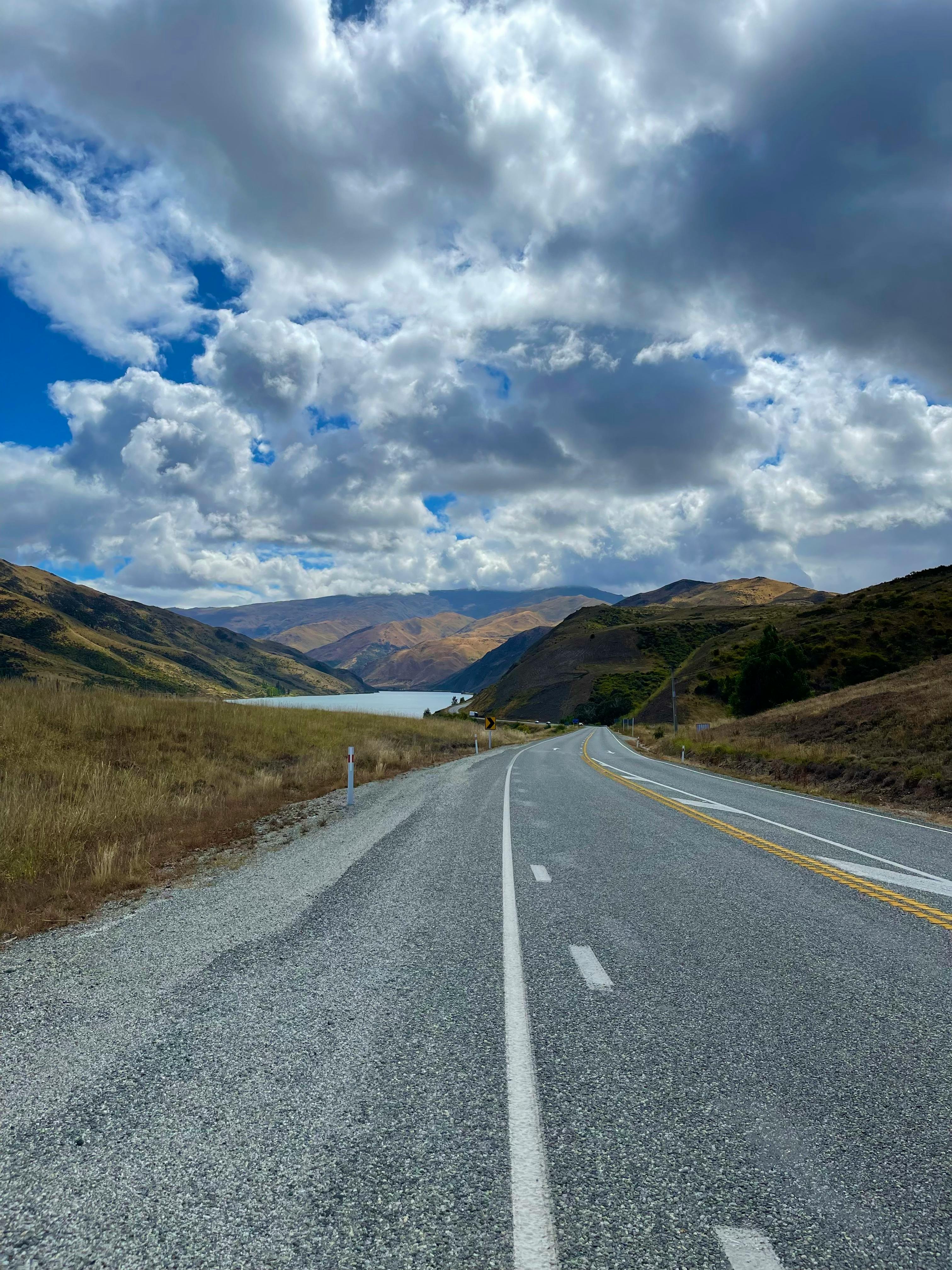 Man Holding A Camera On Busy Street · Free Stock Photo