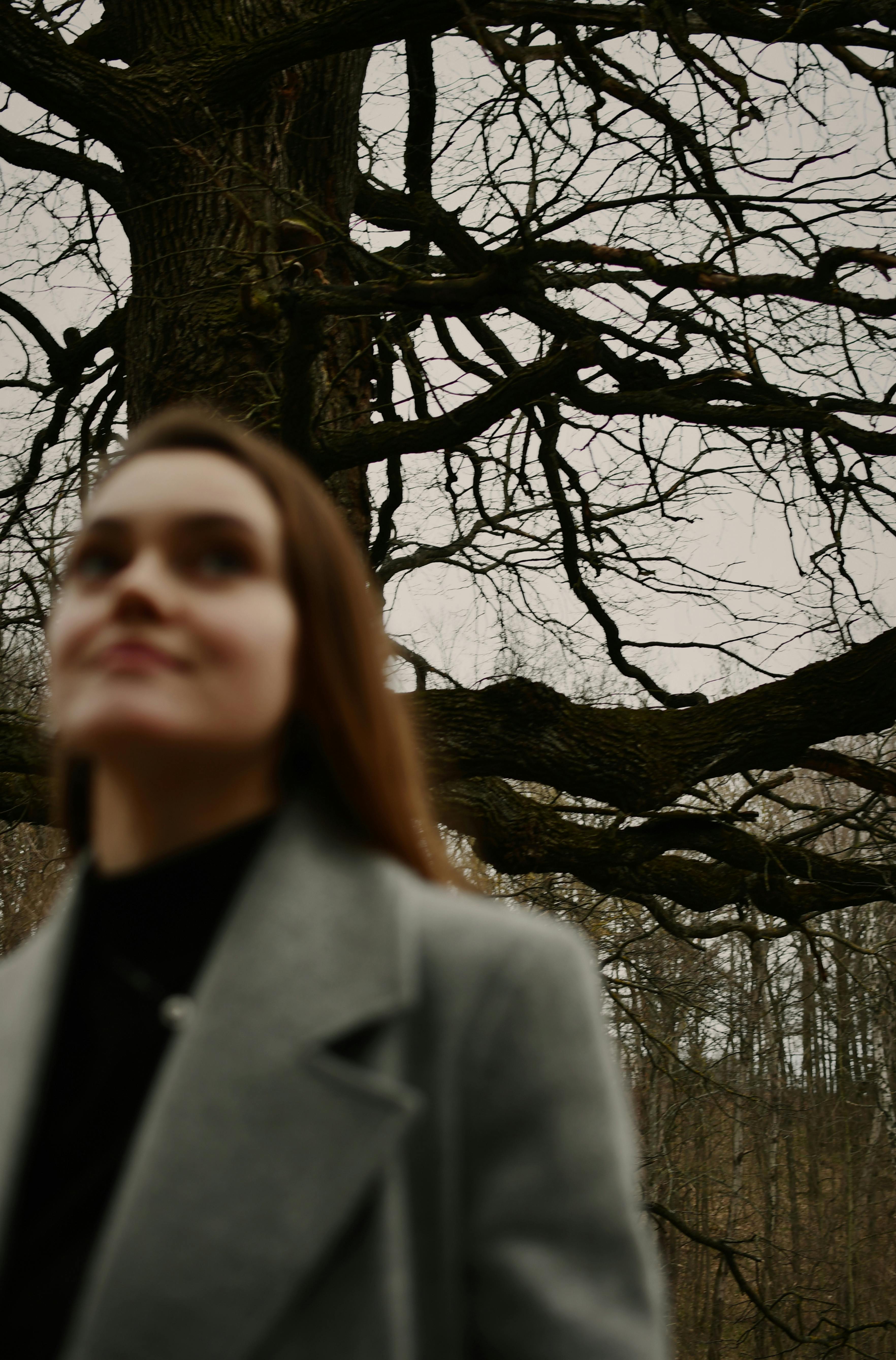 Woman and Tree behind · Free Stock Photo