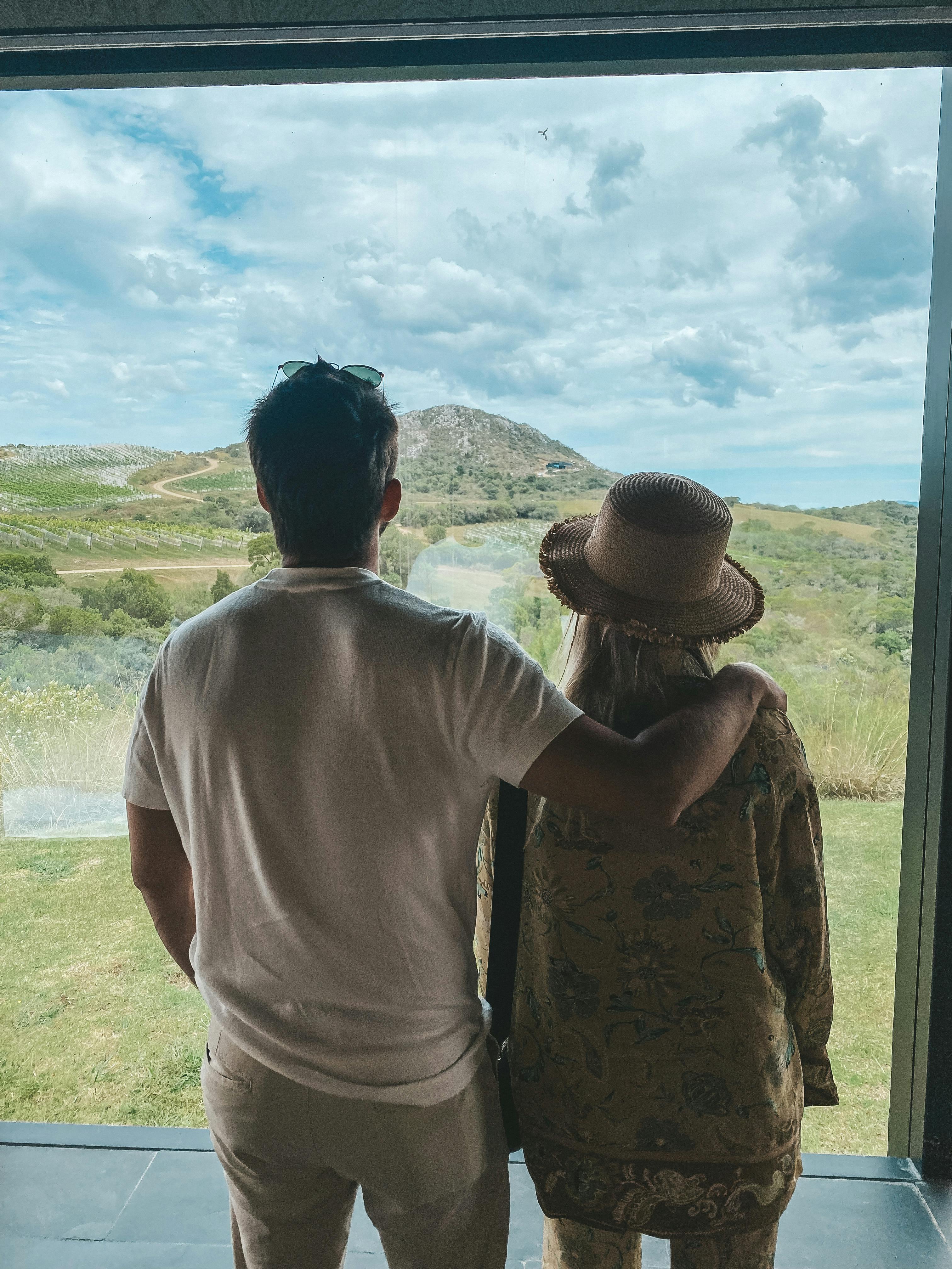 A Man Standing Beside the Window · Free Stock Photo