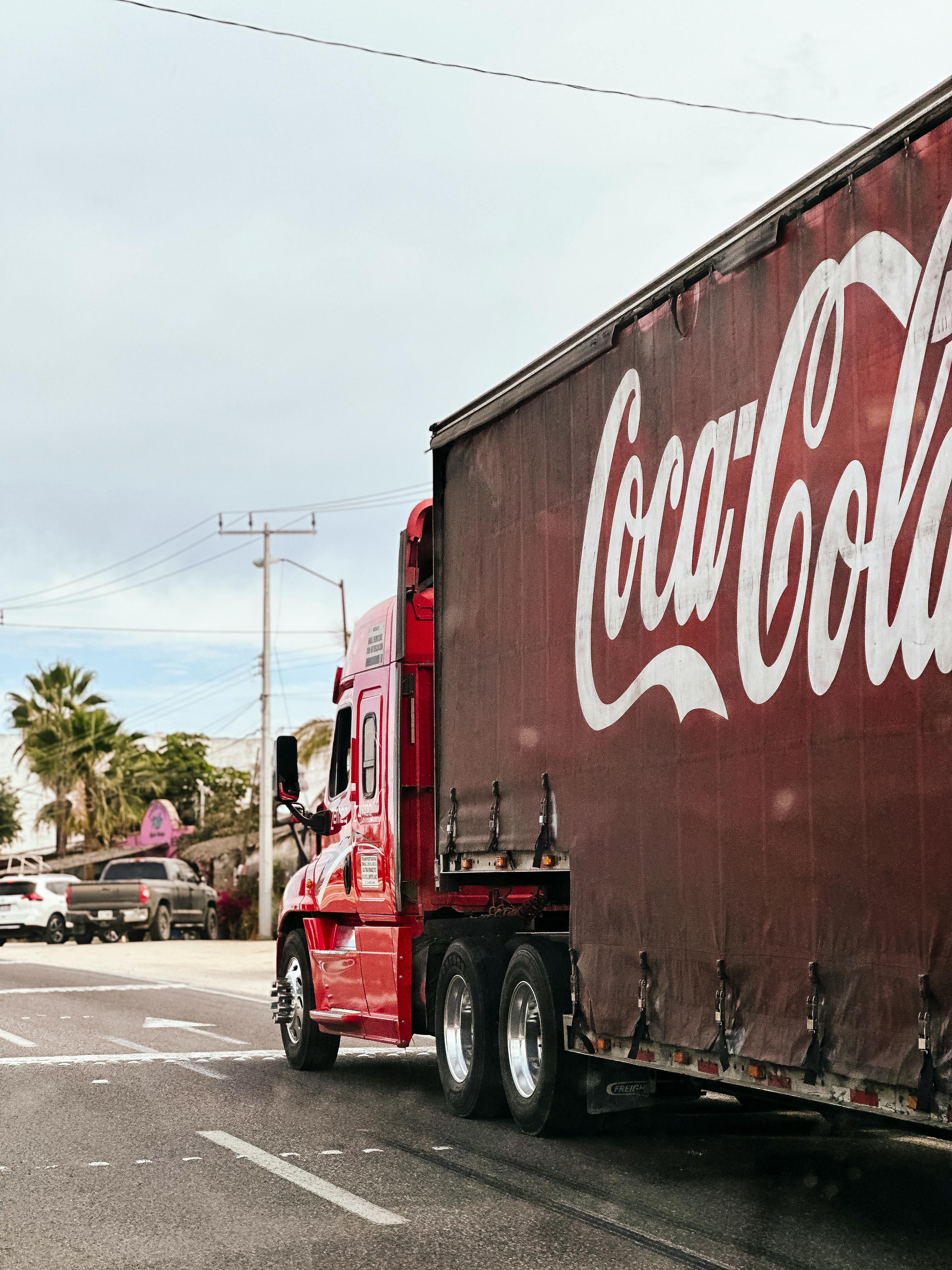 Coca-Cola Billboard by Roadside in City · Free Stock Photo