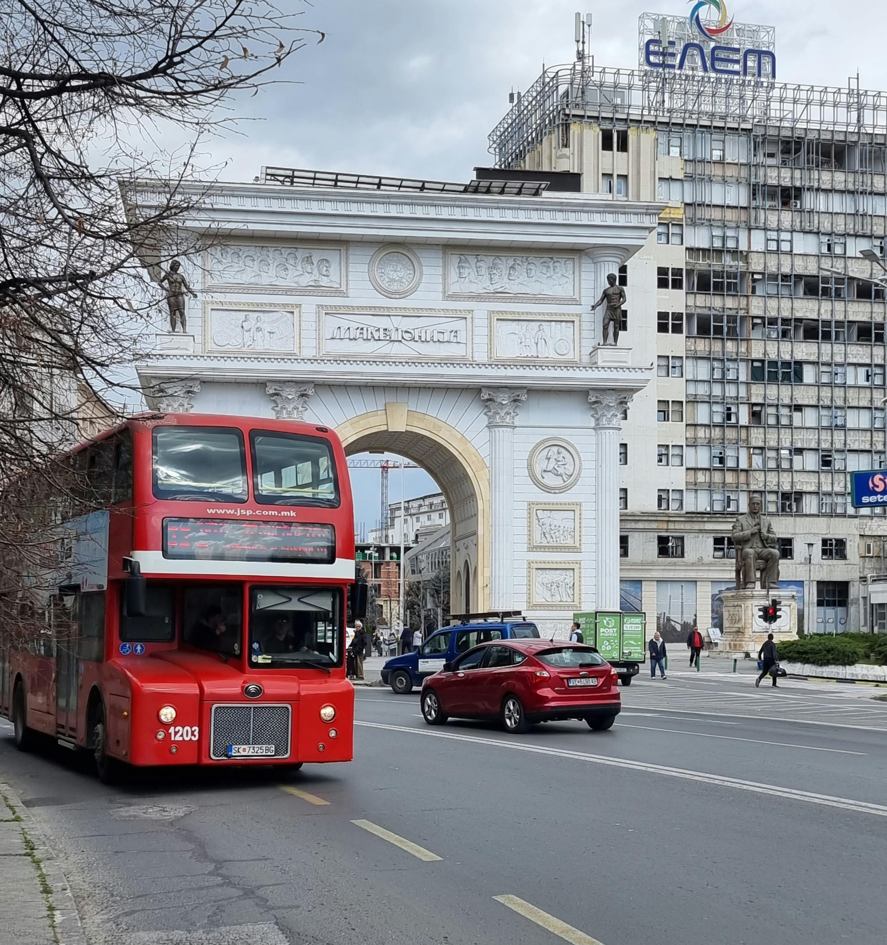 Double Decker Bus near Macedonia Gate in Skopje · Free Stock Photo