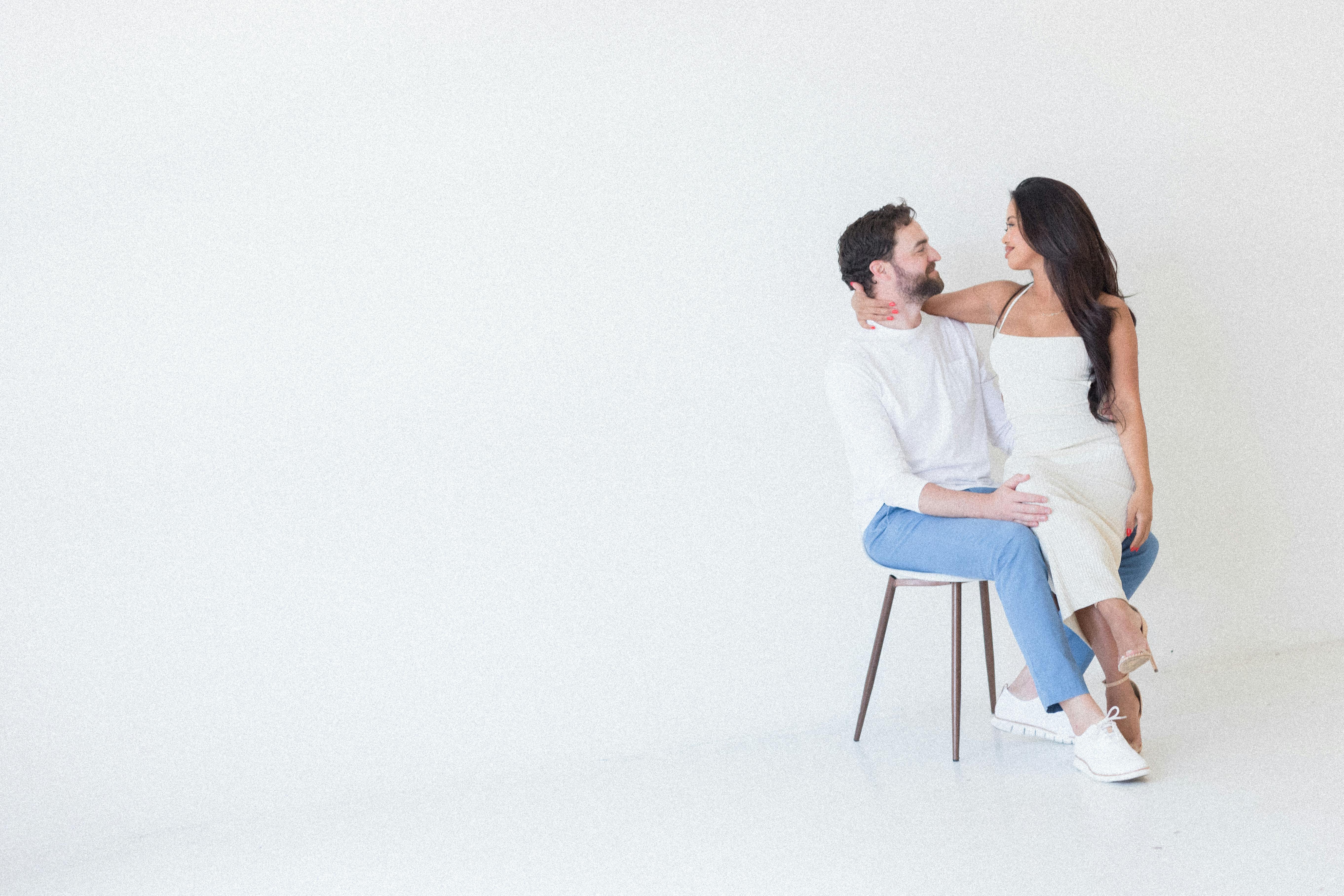Couple Sitting and Hugging · Free Stock Photo