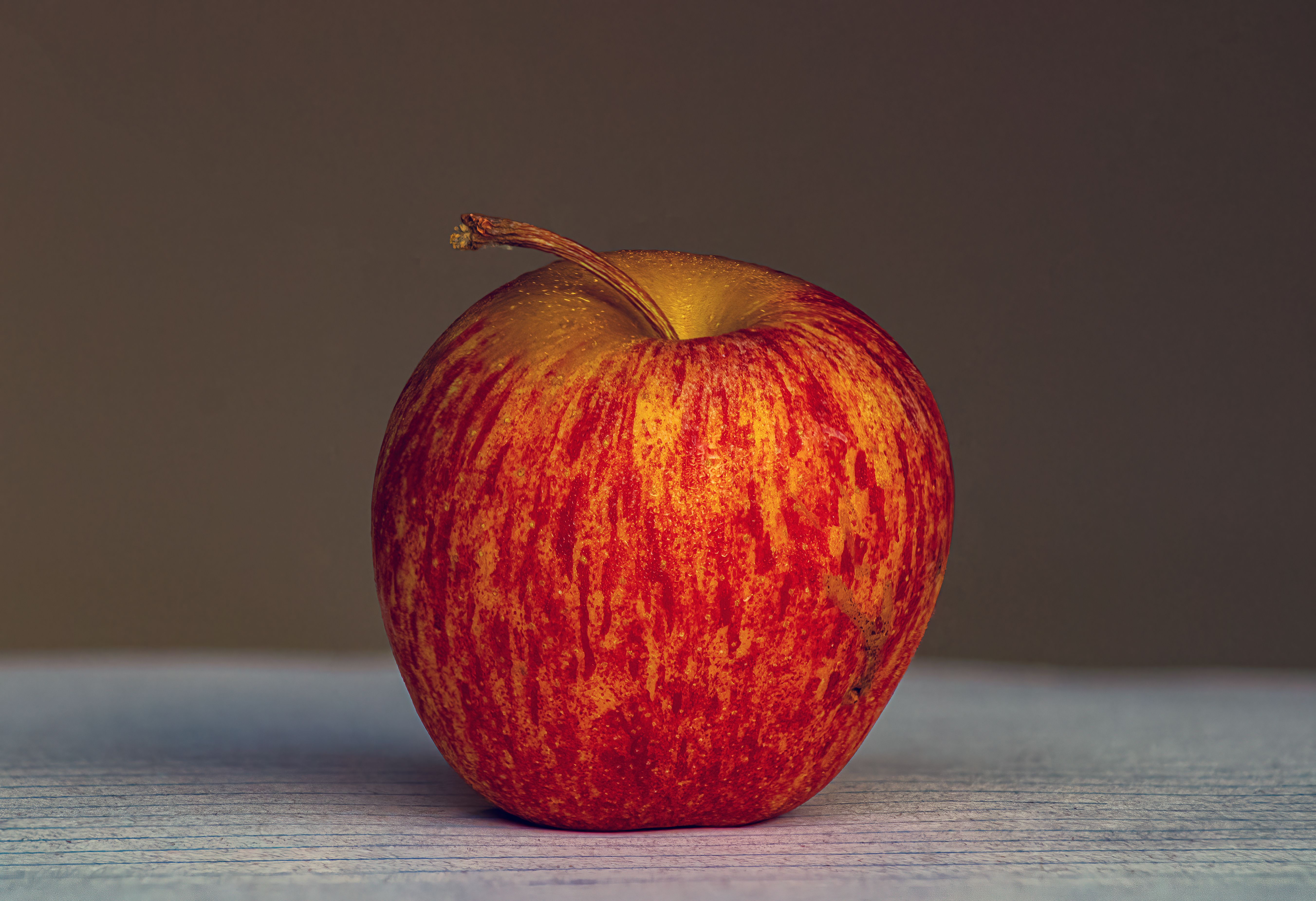 Red Apple on Blue Background · Free Stock Photo