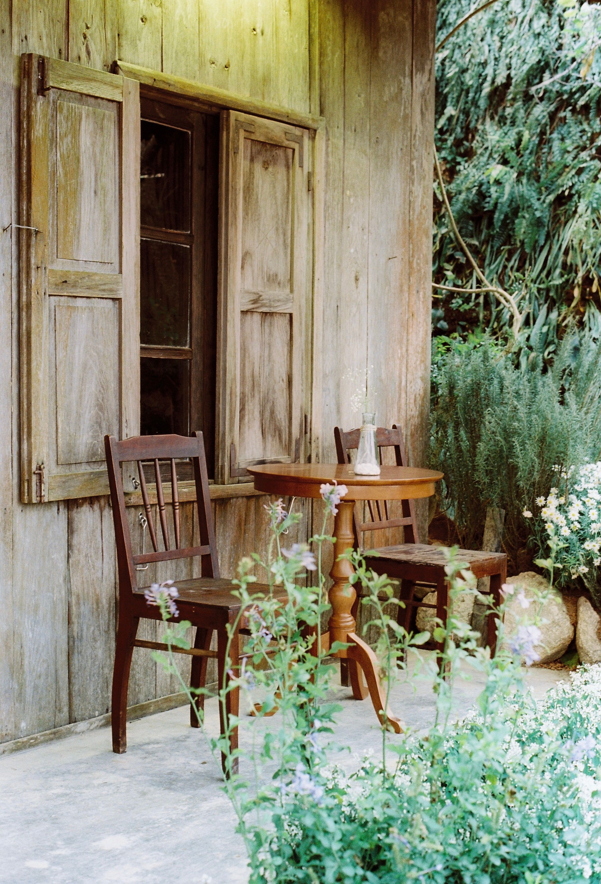 Wooden Furniture Outside House in Garden · Free Stock Photo