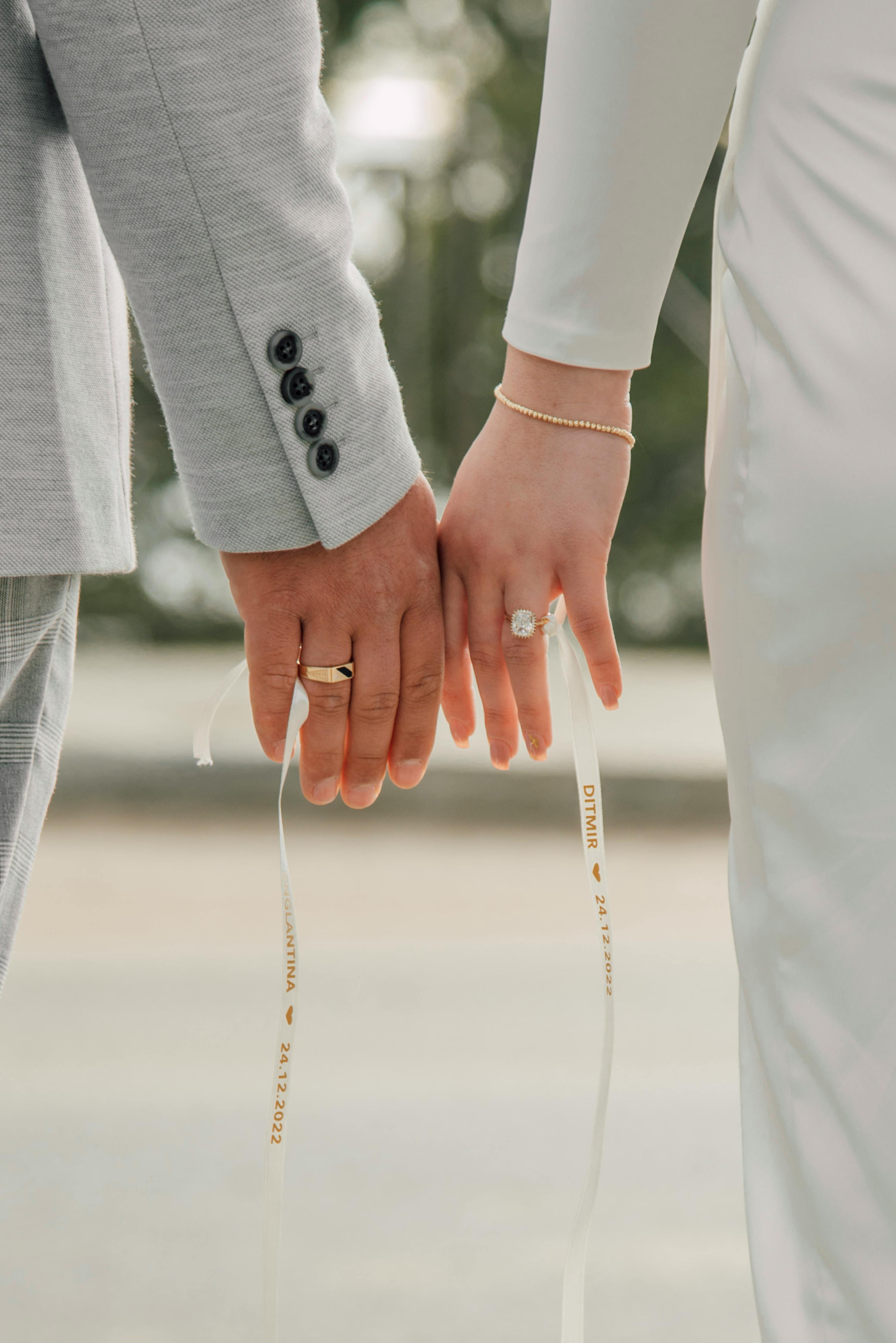 Two Person With Rings on Ring Fingers · Free Stock Photo