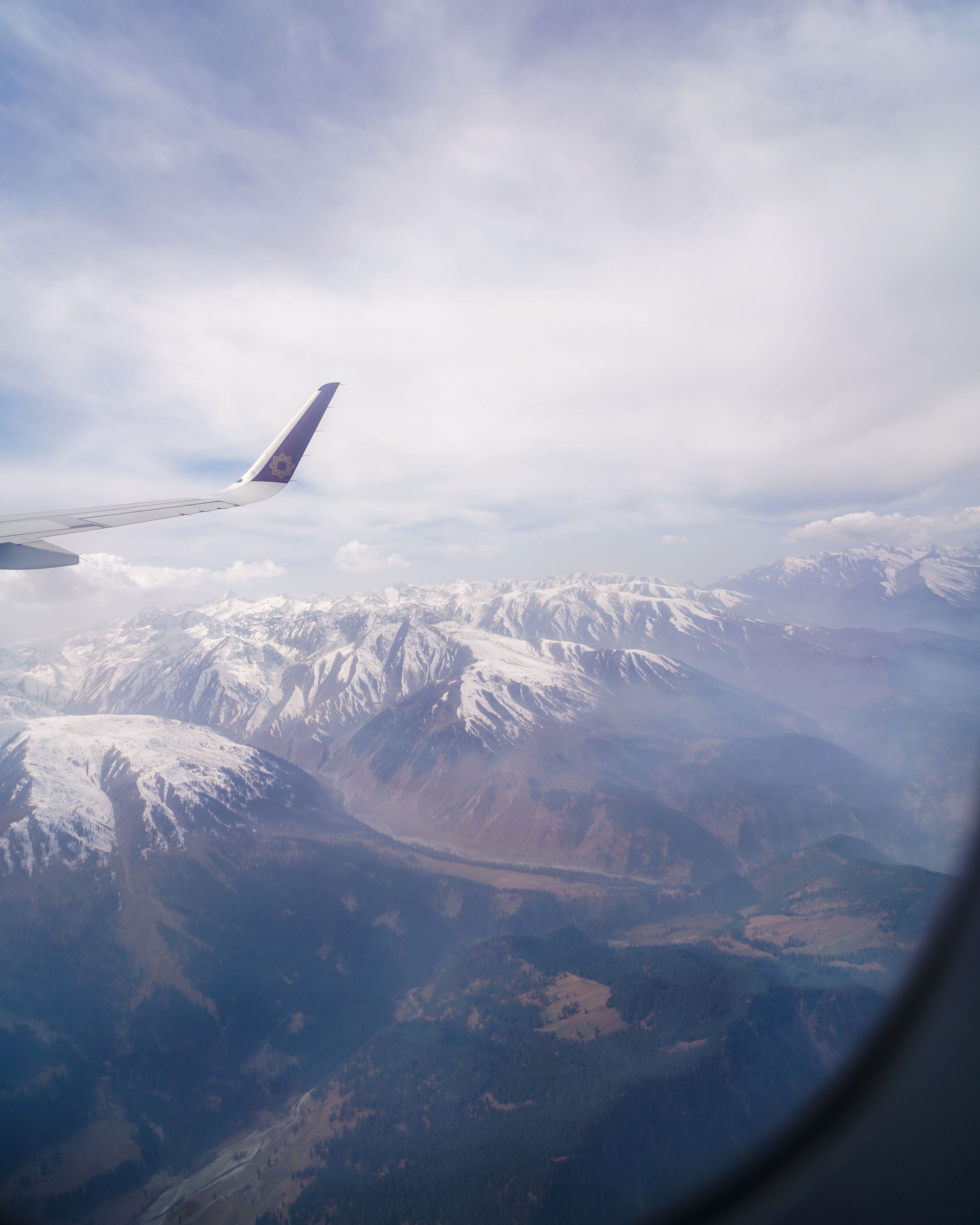 Wing of Airplane over Mountains · Free Stock Photo