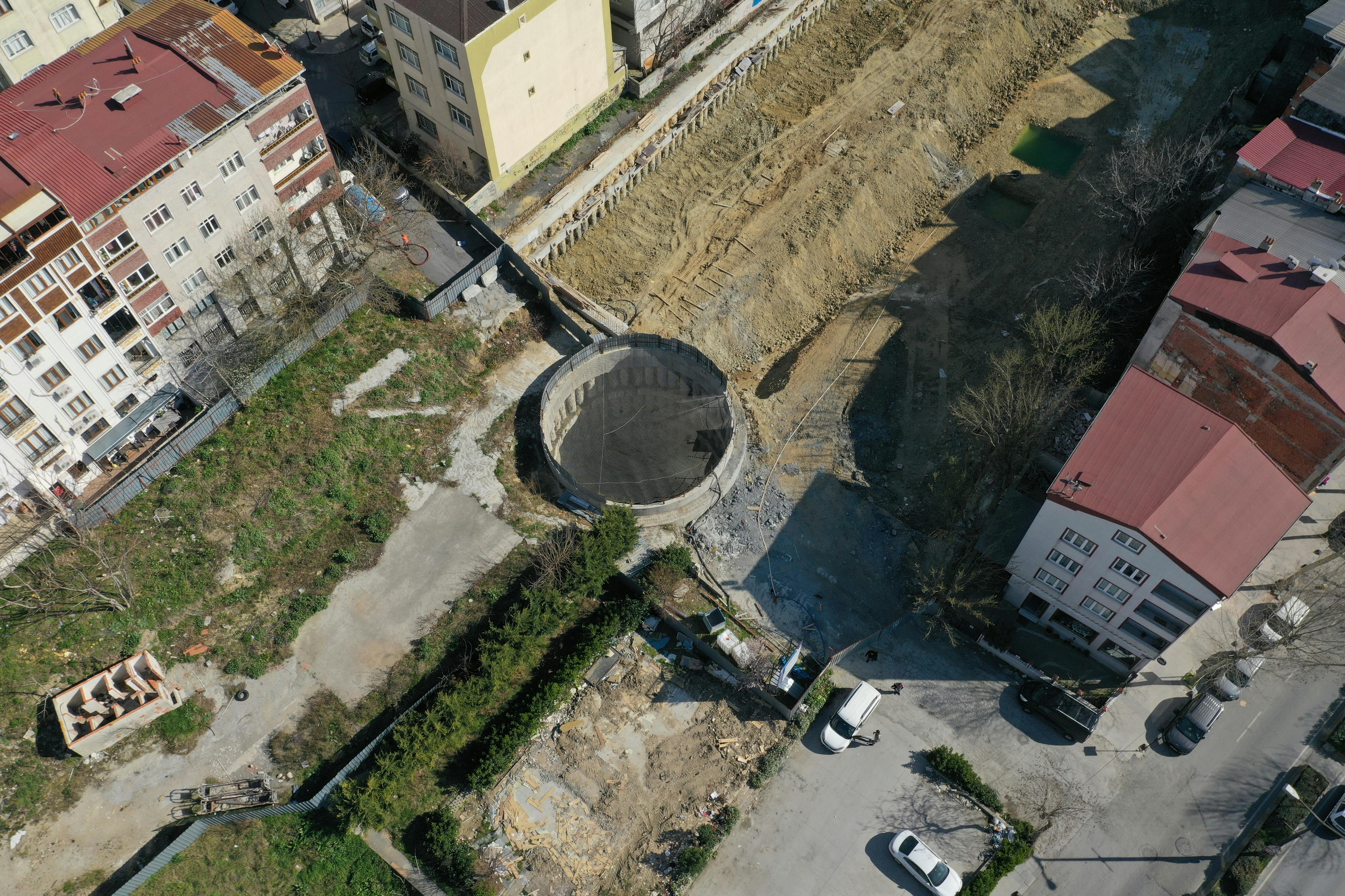 Covered Borehole among Buildings · Free Stock Photo