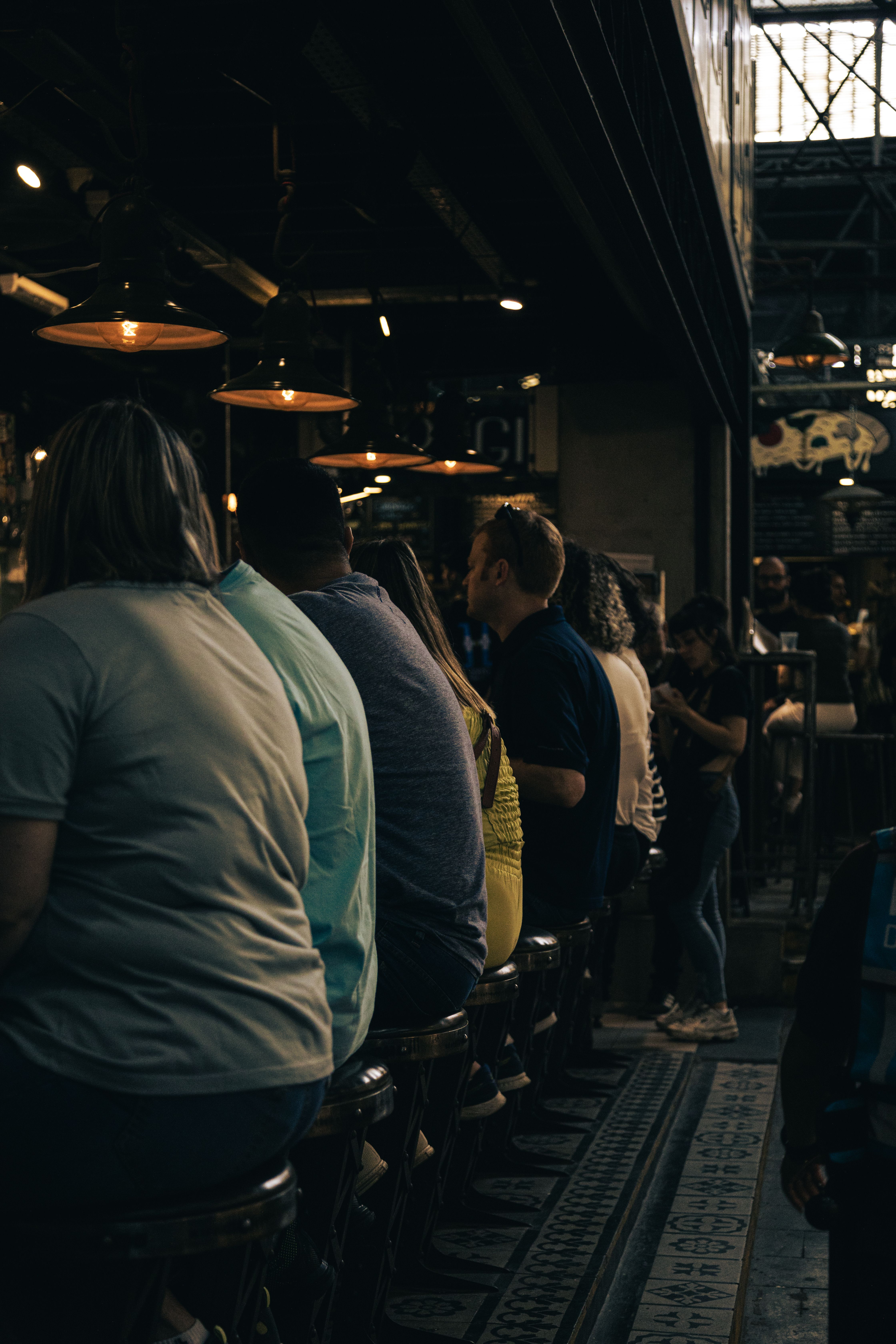 People Sitting at the Bar Counter · Free Stock Photo