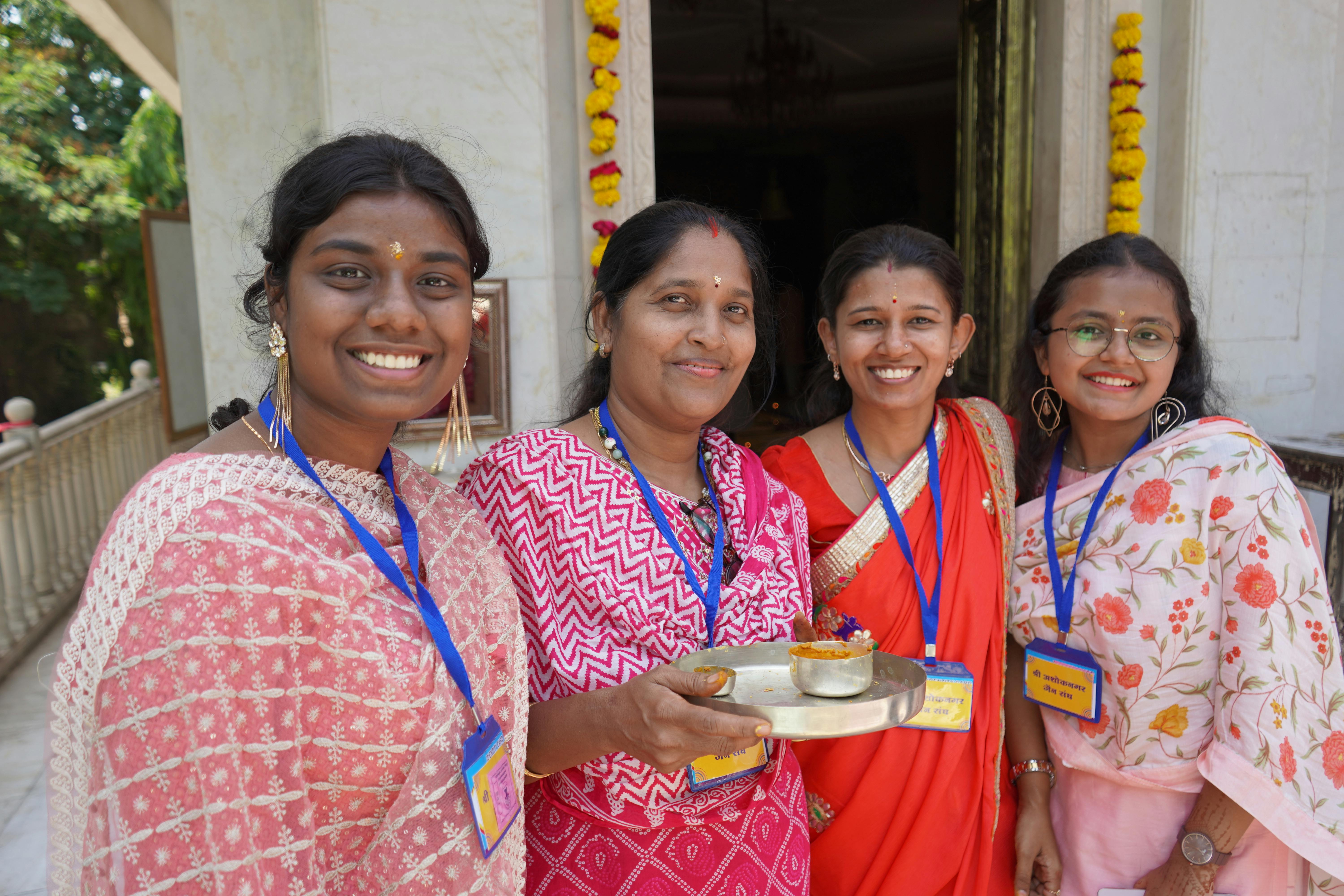 A Group of Women in Traditional Dresses Wearing ID Badges · Free Stock ...